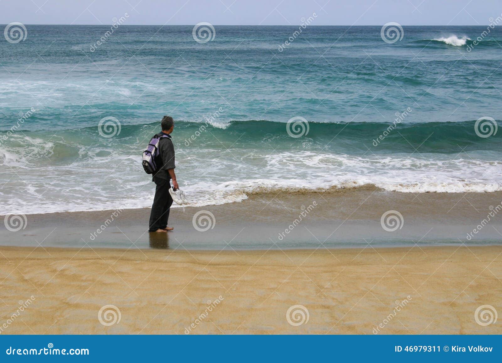 Man Standing on a Beach and Looking at the Ocean Stock Image - Image of ...