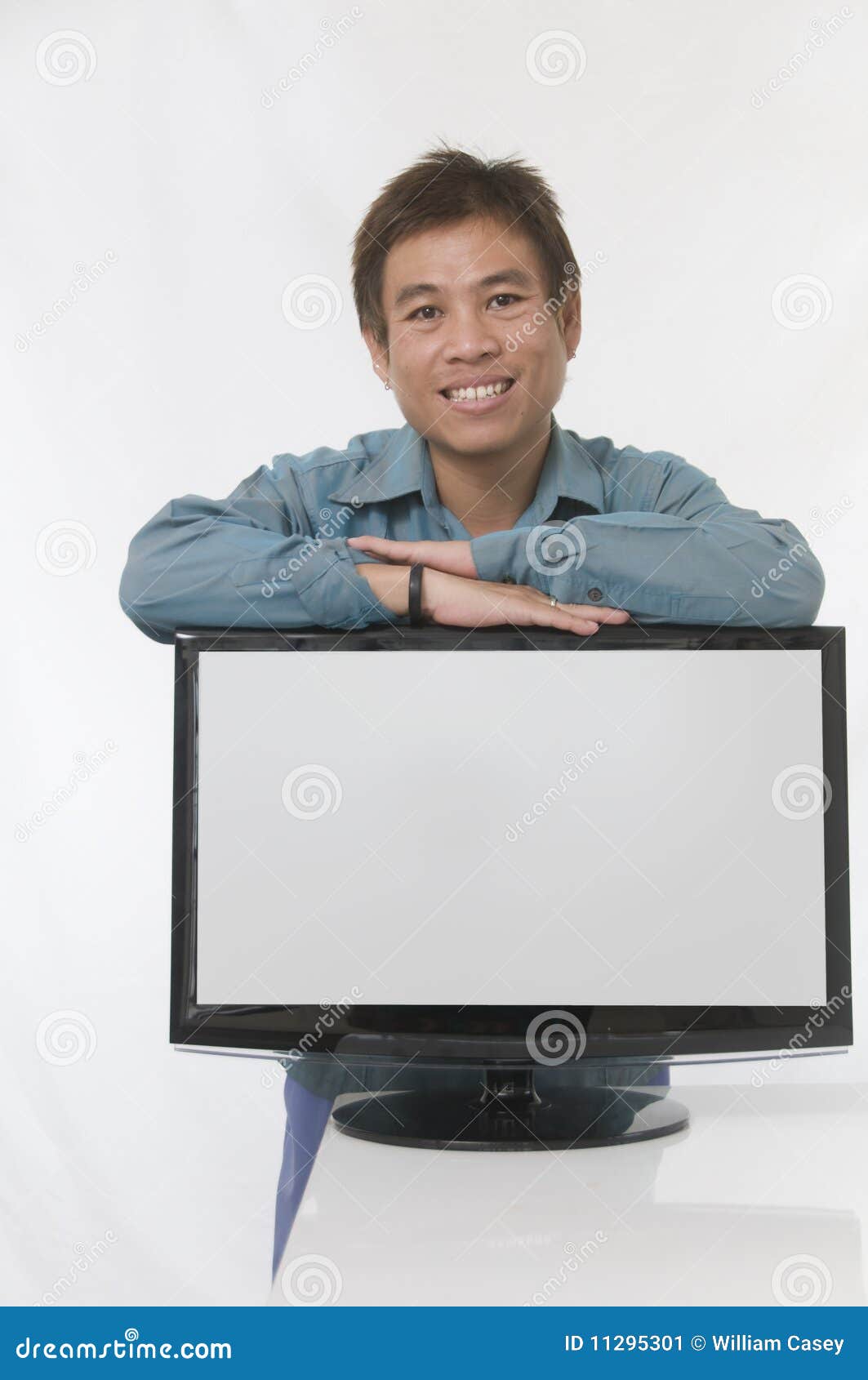 Man Standing Behind Monitor Stock Image - Image of happy, fashionable ...