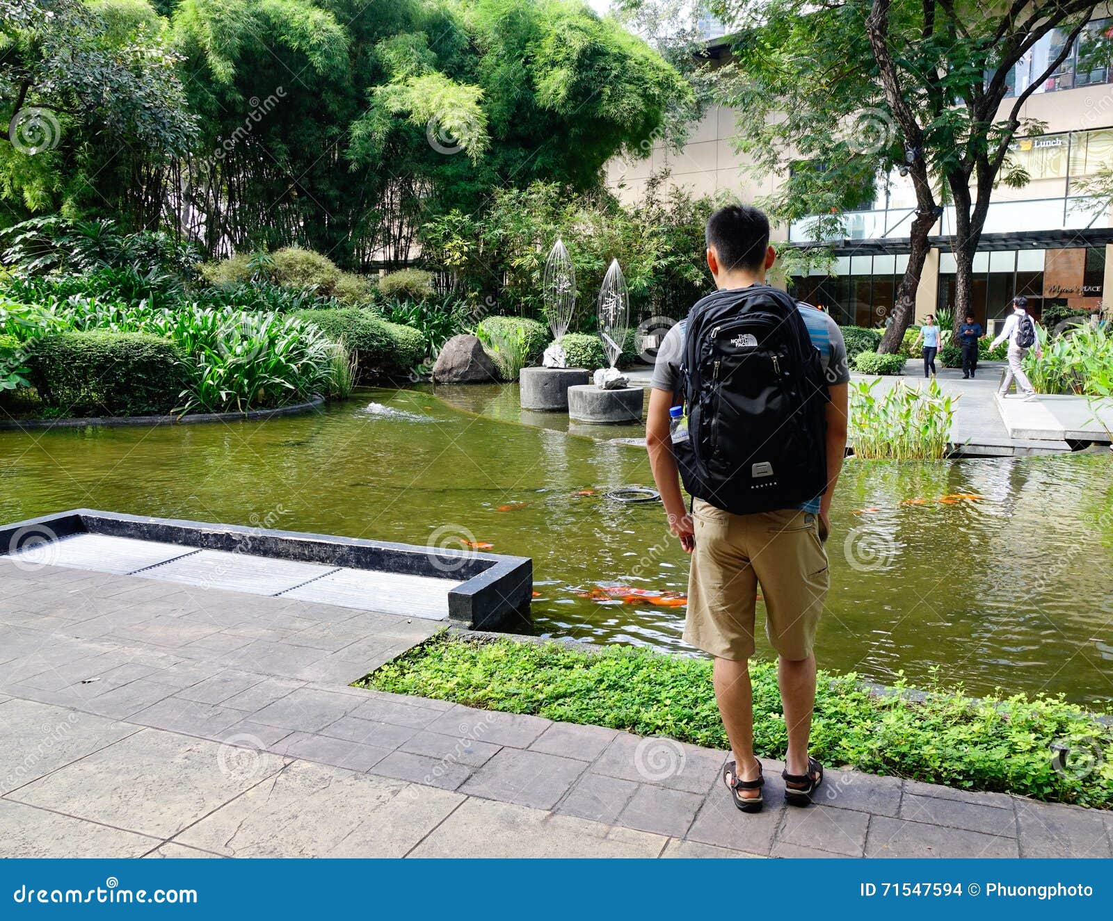A Man Standing at the Botanic Garden in Manila, Philippines Editorial ...
