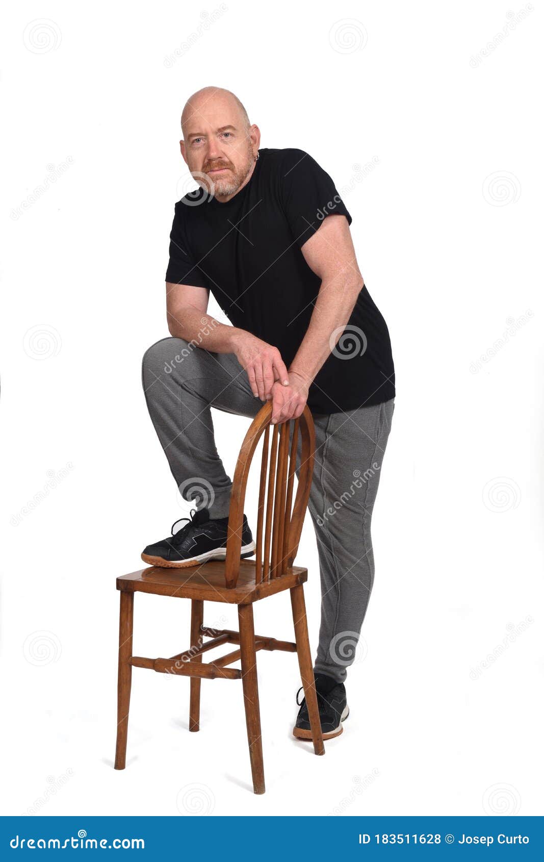 Man Standing with a Chair in White Background Stock Photo - Image of ...