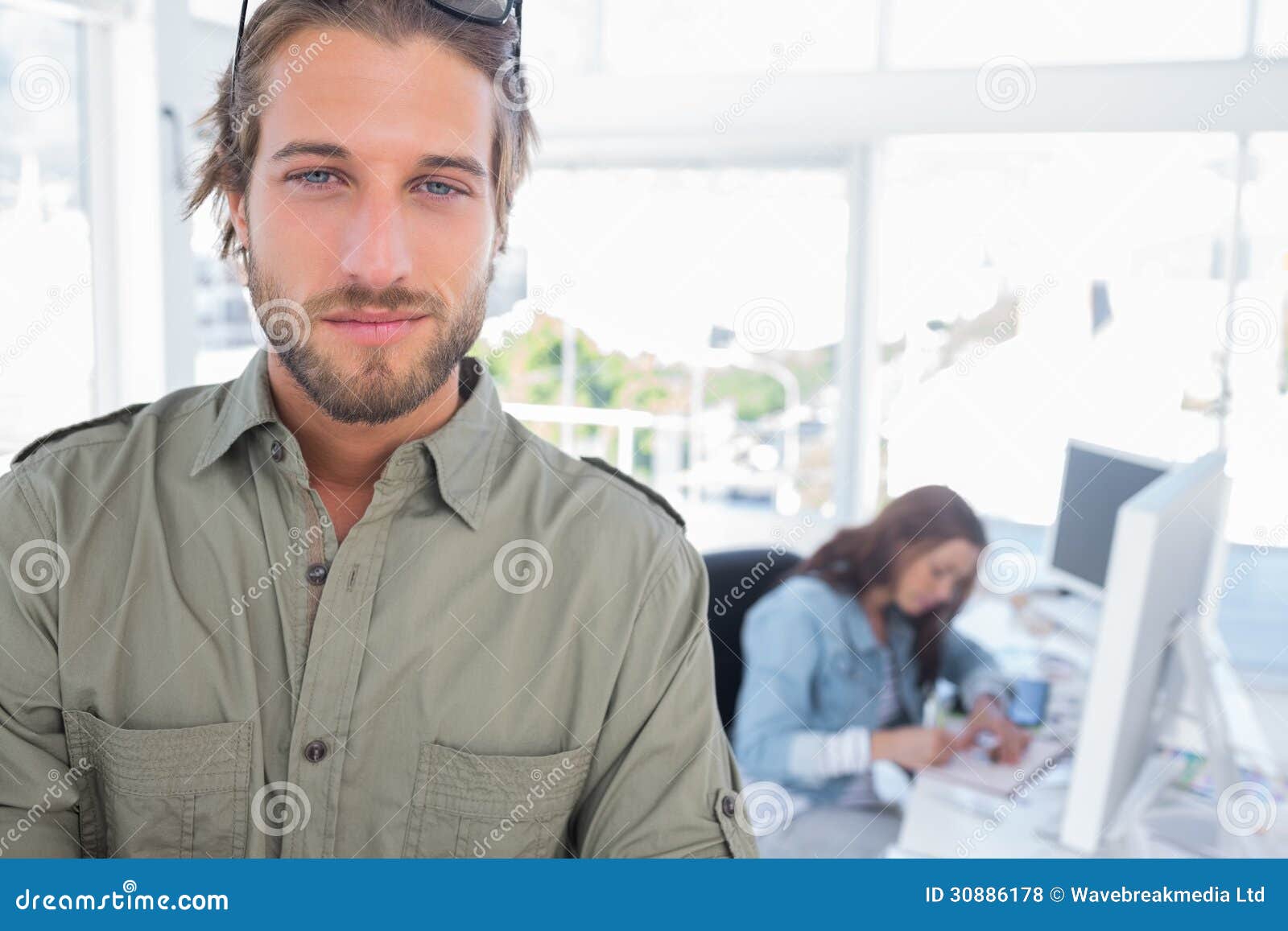 Man Standing in Creative Office with Arms Folded Stock Photo - Image of ...