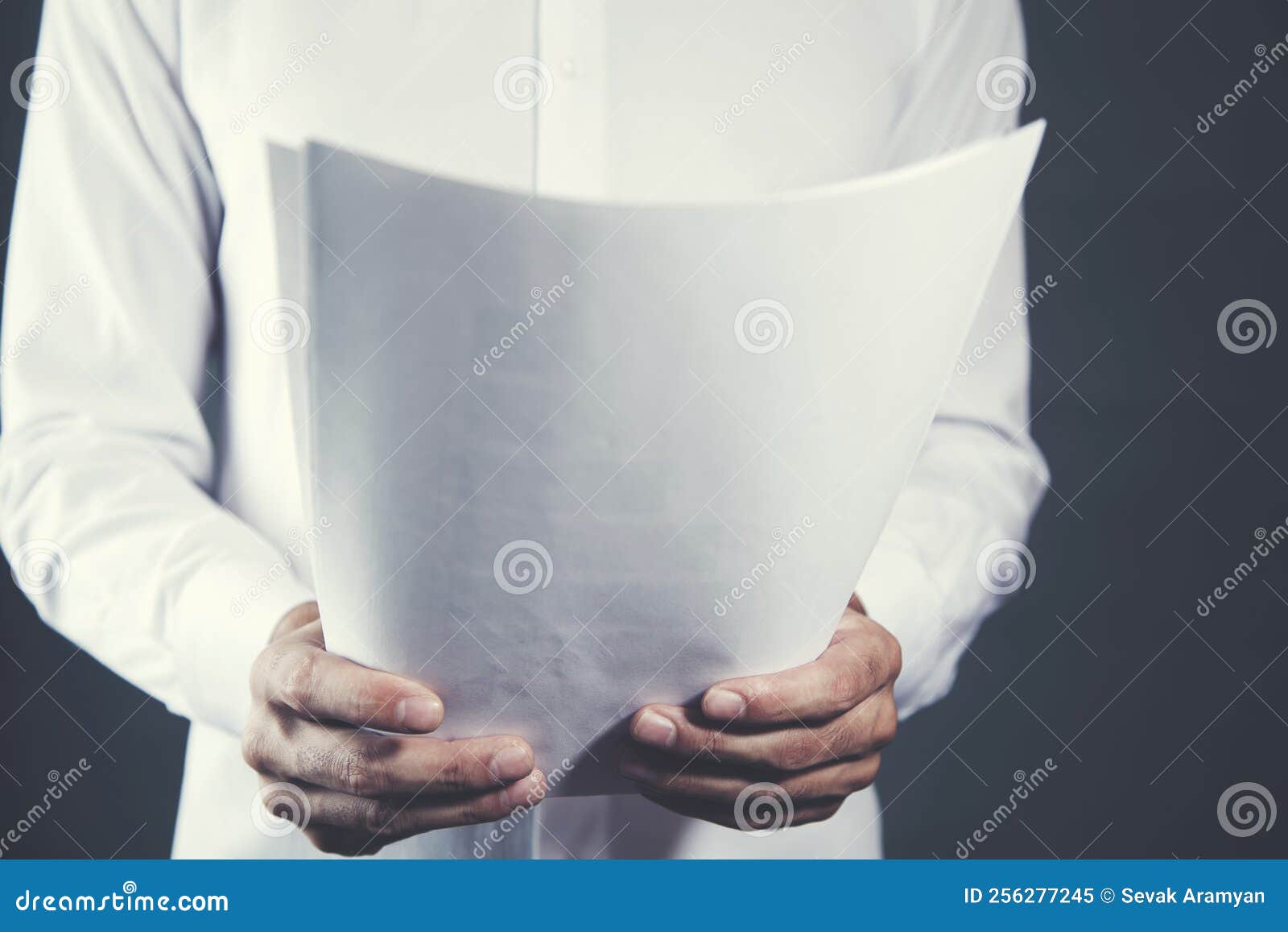 Man Standing with Document in Hand Stock Image - Image of contract ...
