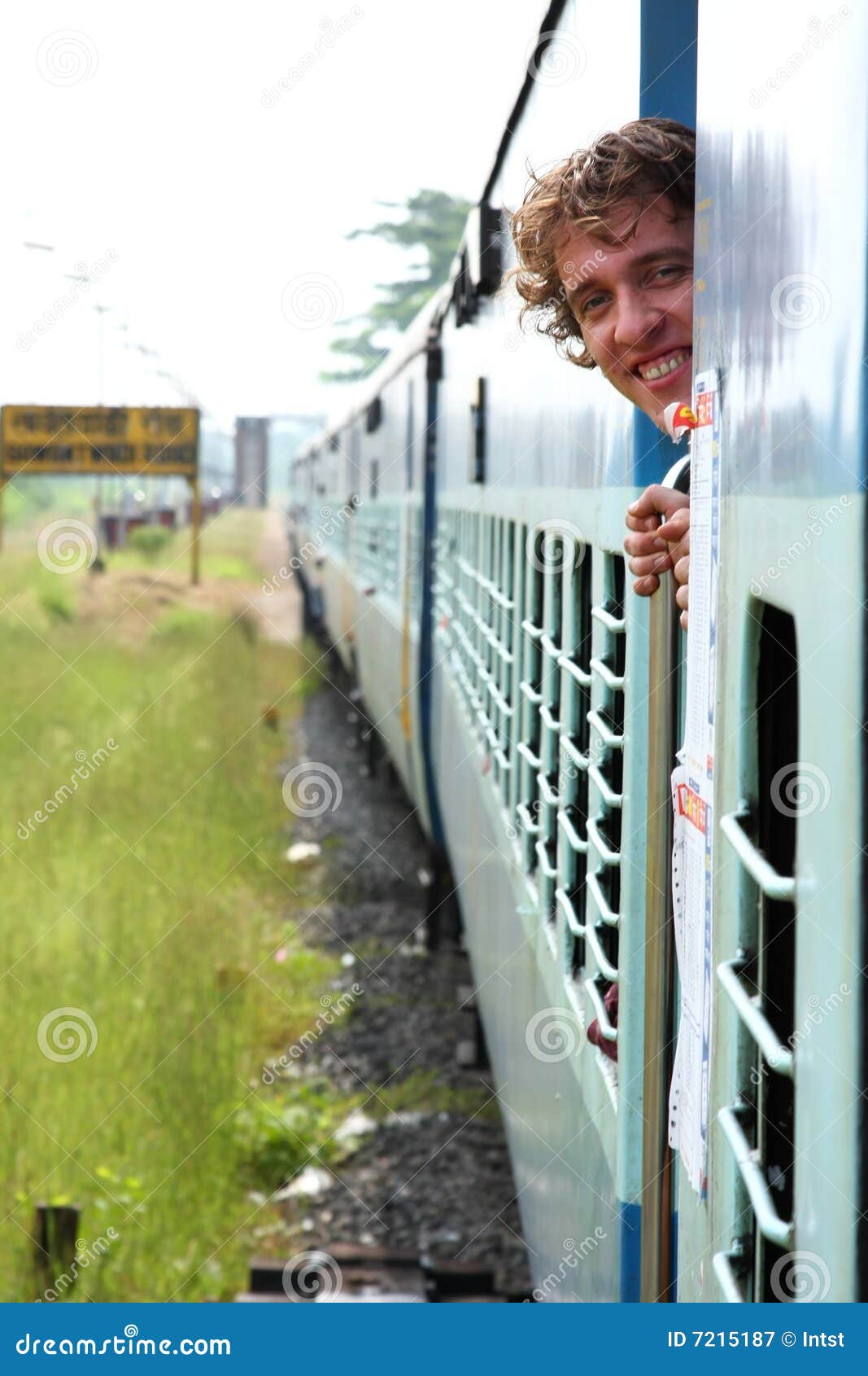 Man Standing in Doors of Train Stock Image - Image of doors, driving ...
