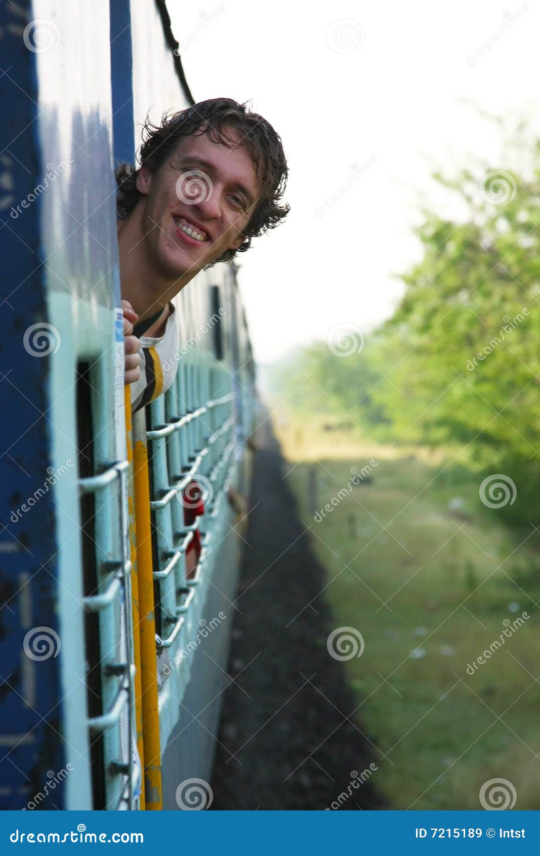 Man Standing in Doors of Train Stock Image - Image of freedom, fast ...