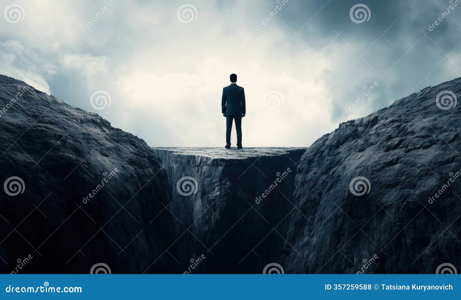 Man Standing on Edge of Cliff Contemplating Vast Chasm, Dramatic Sky ...