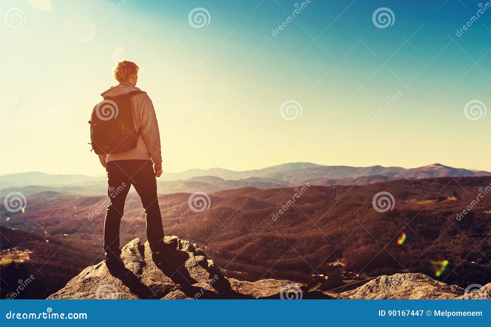 Man Standing at the Edge of a Cliff Stock Image - Image of adventure ...