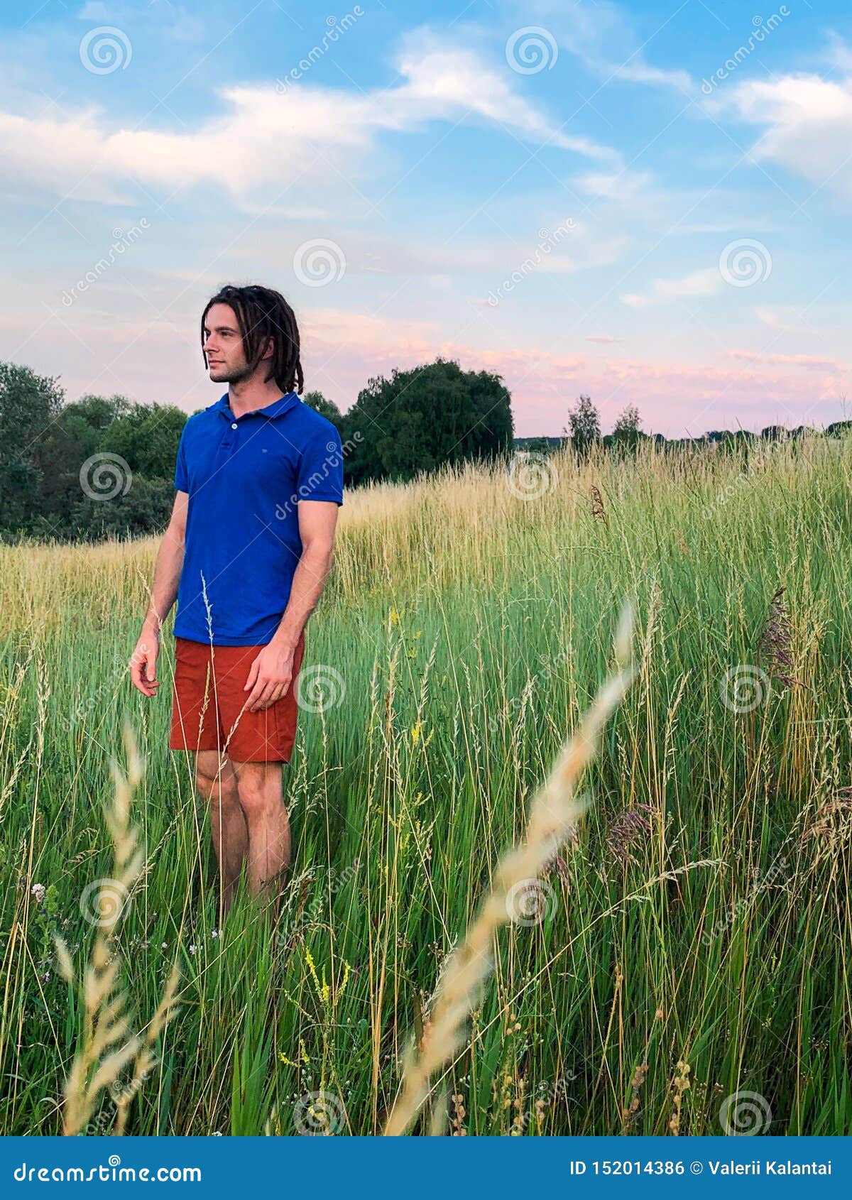 Man Standing in the Field at Nature Stock Photo - Image of alone ...