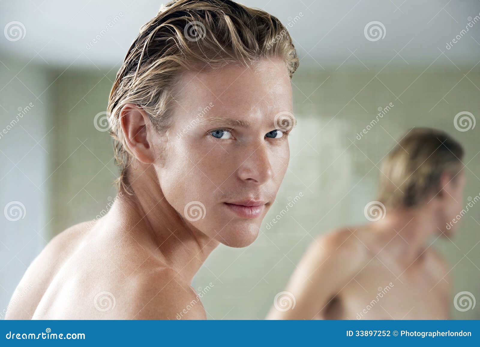 Man Standing in Front of Bathroom Mirror Stock Photo - Image of ...