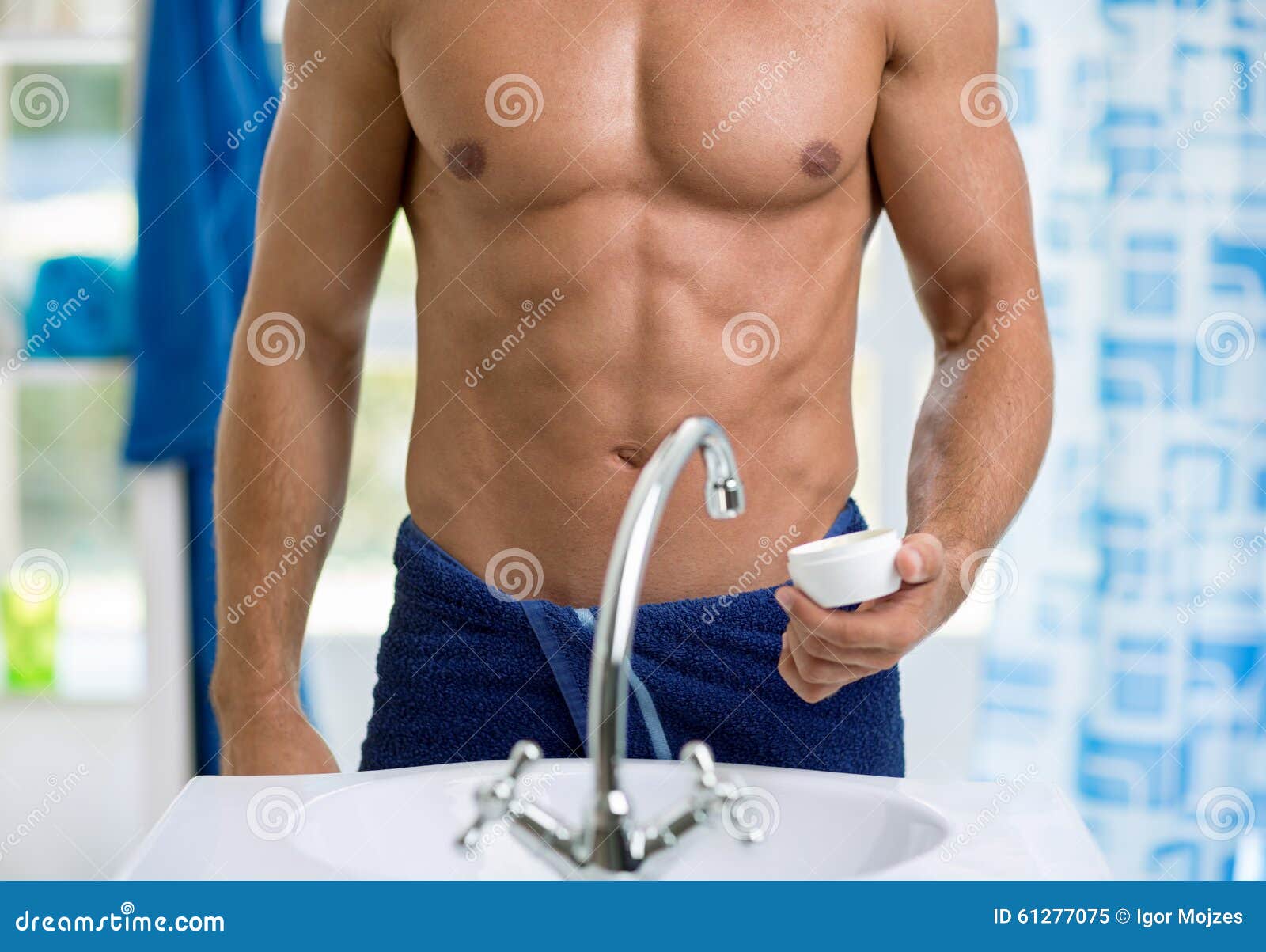 Man Standing in Front of the Bathroom Sink Stock Image - Image of ...