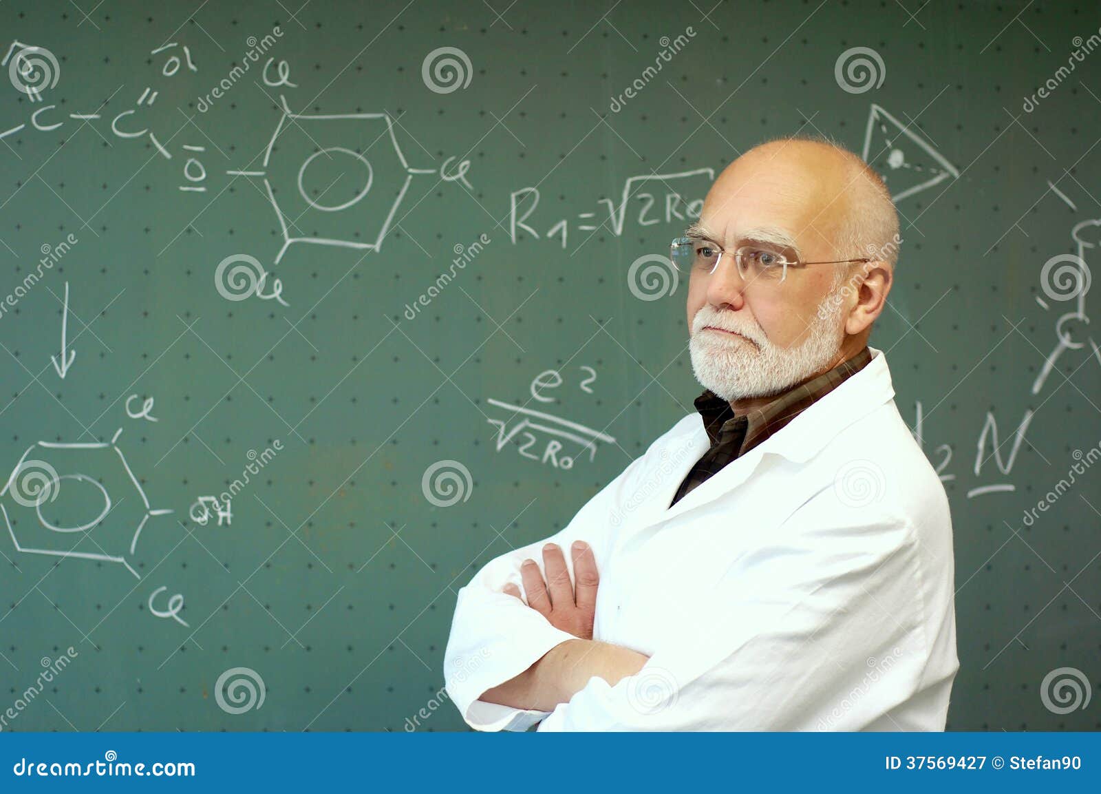 Professor Stands In Front Of A Blackboard Stock Photo | CartoonDealer ...