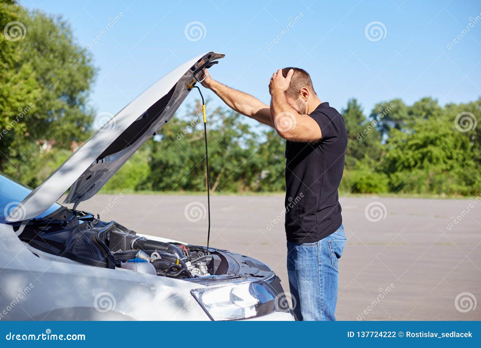 Man Standing in Front of a Broken Car Stock Photo - Image of automobile ...