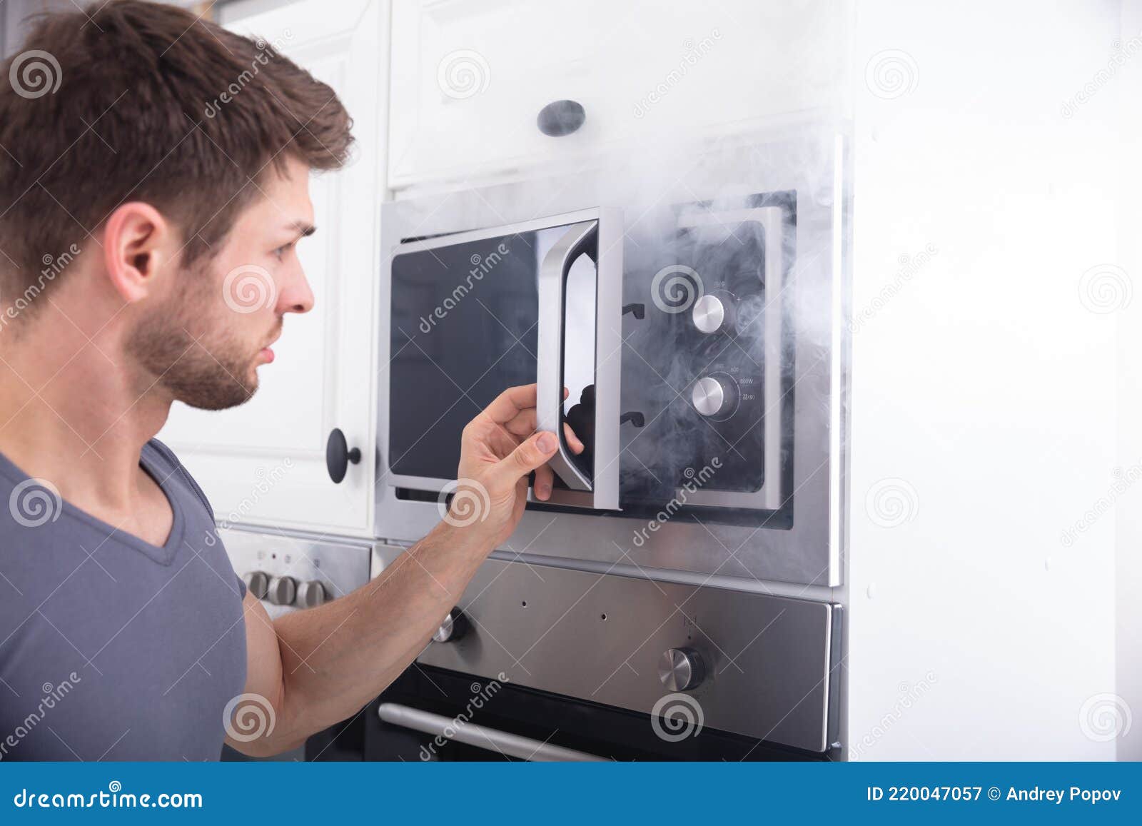 Man Standing in Front of Burning Oven Stock Image - Image of adult ...