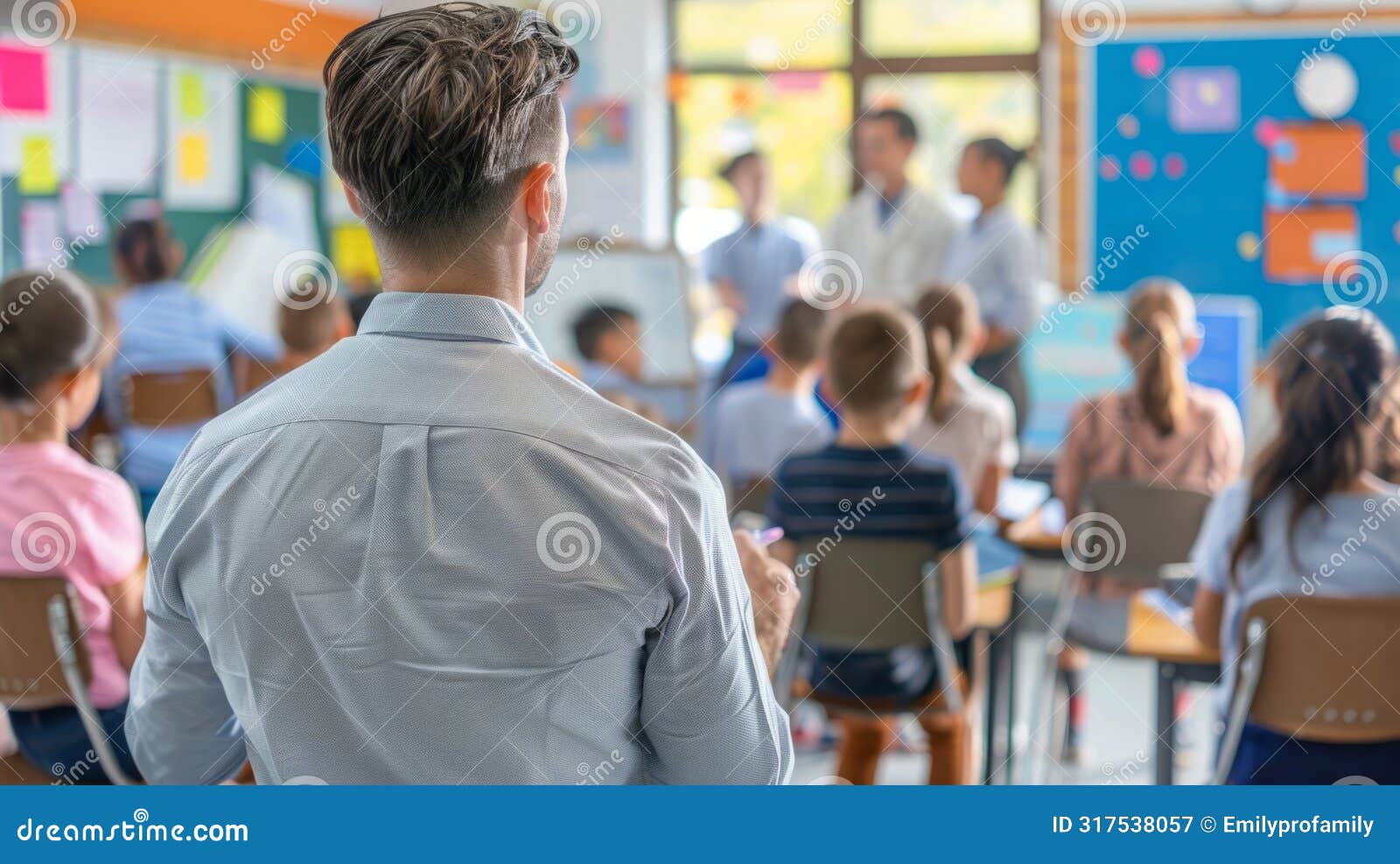 Man Standing in Front of Classroom Full of Students Stock Image - Image ...