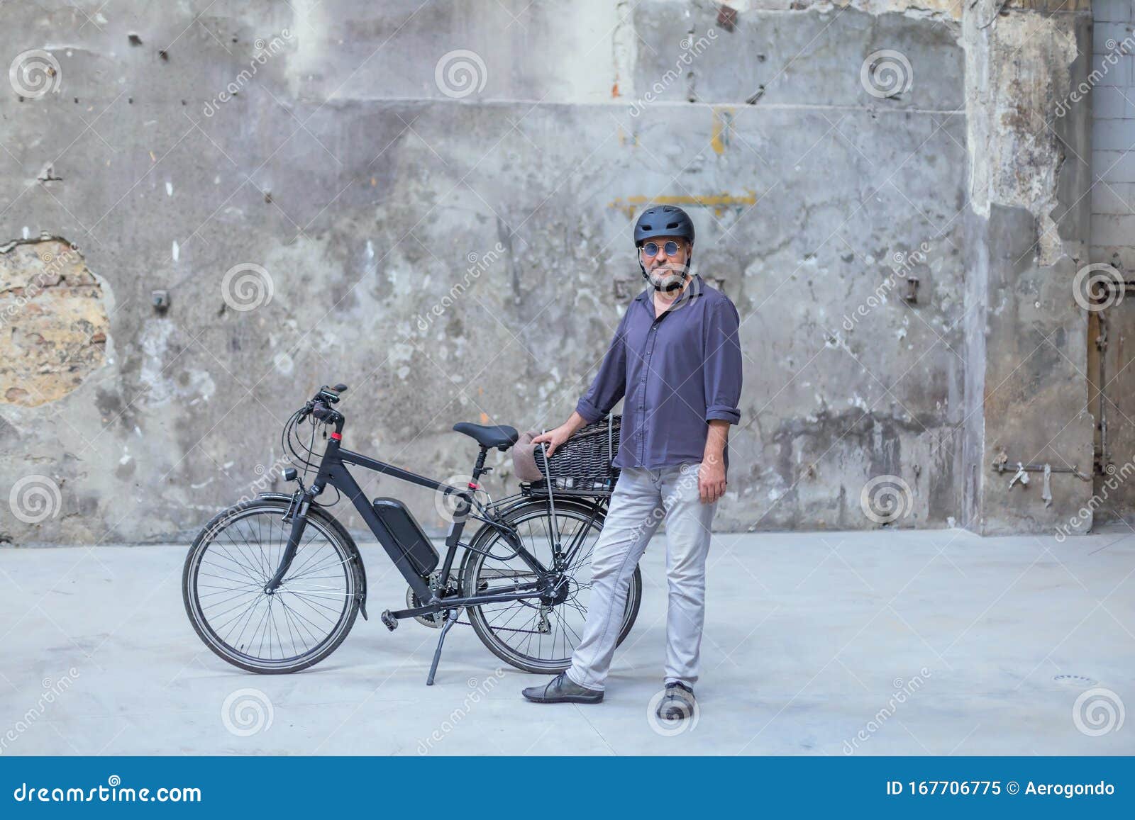 Man Standing in Front of Electric Bicycle Stock Image - Image of helmet ...