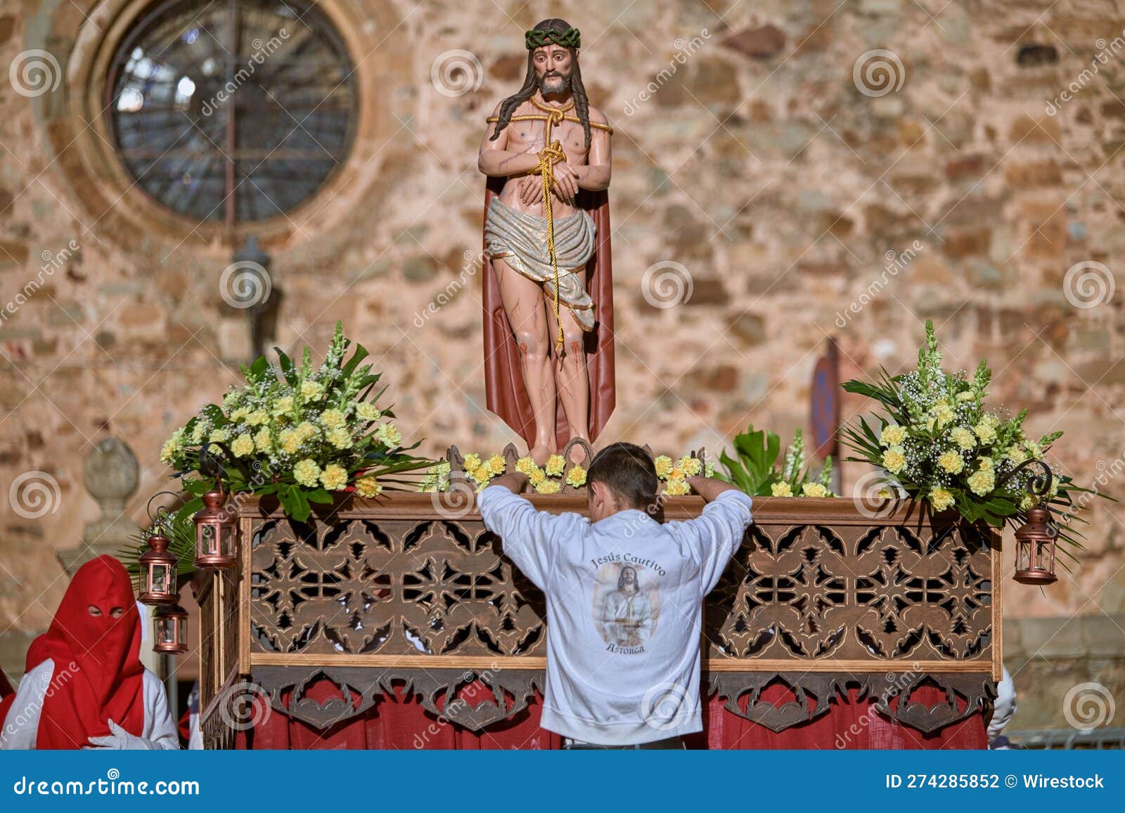 Man Standing in Front of a Statue of Jesus. Stock Photo - Image of ... Man Standing in Front of a Statue of Jesus. Stock Photo - Image of ...