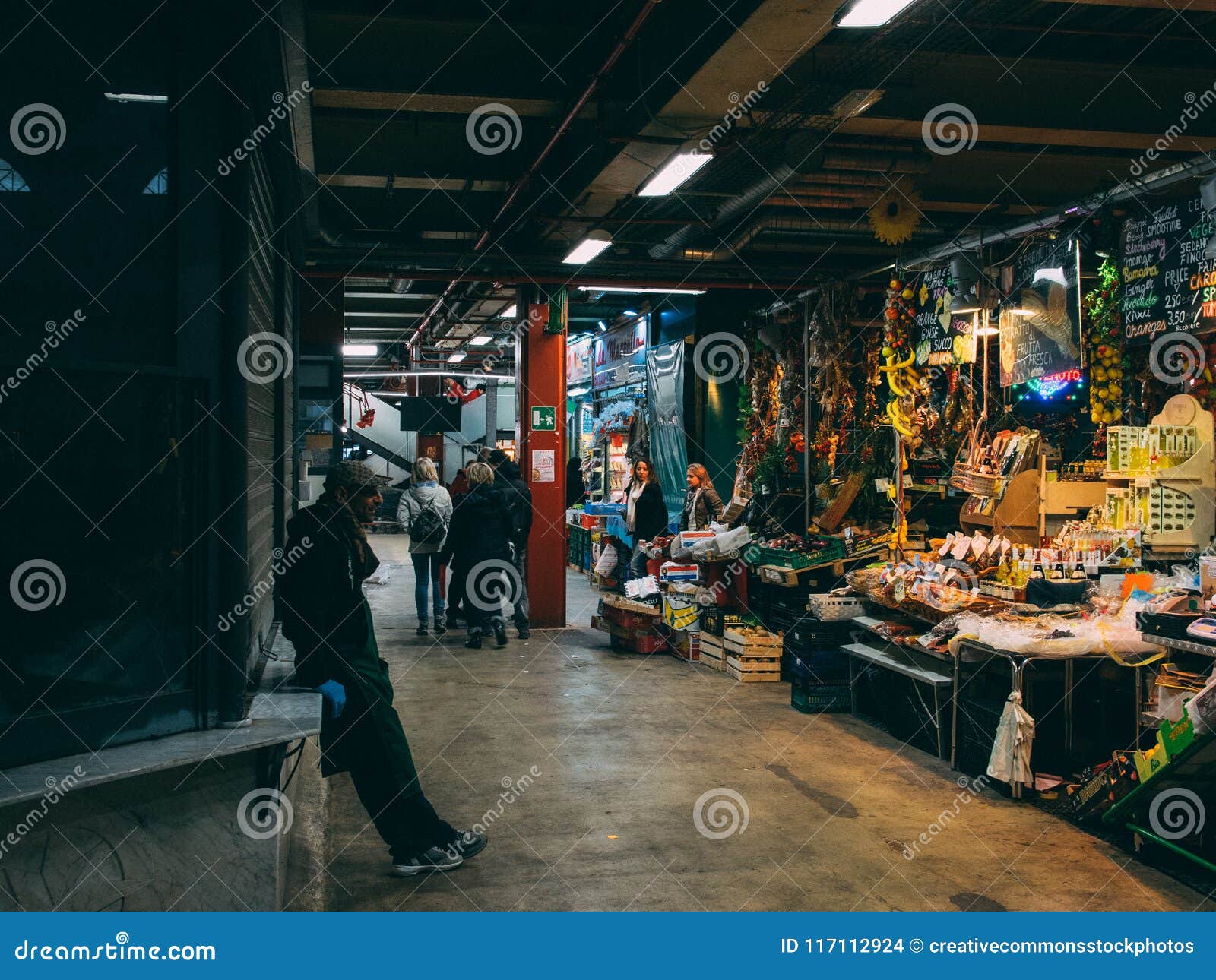 Man Standing In Front Of Store Picture. Image: 117112924