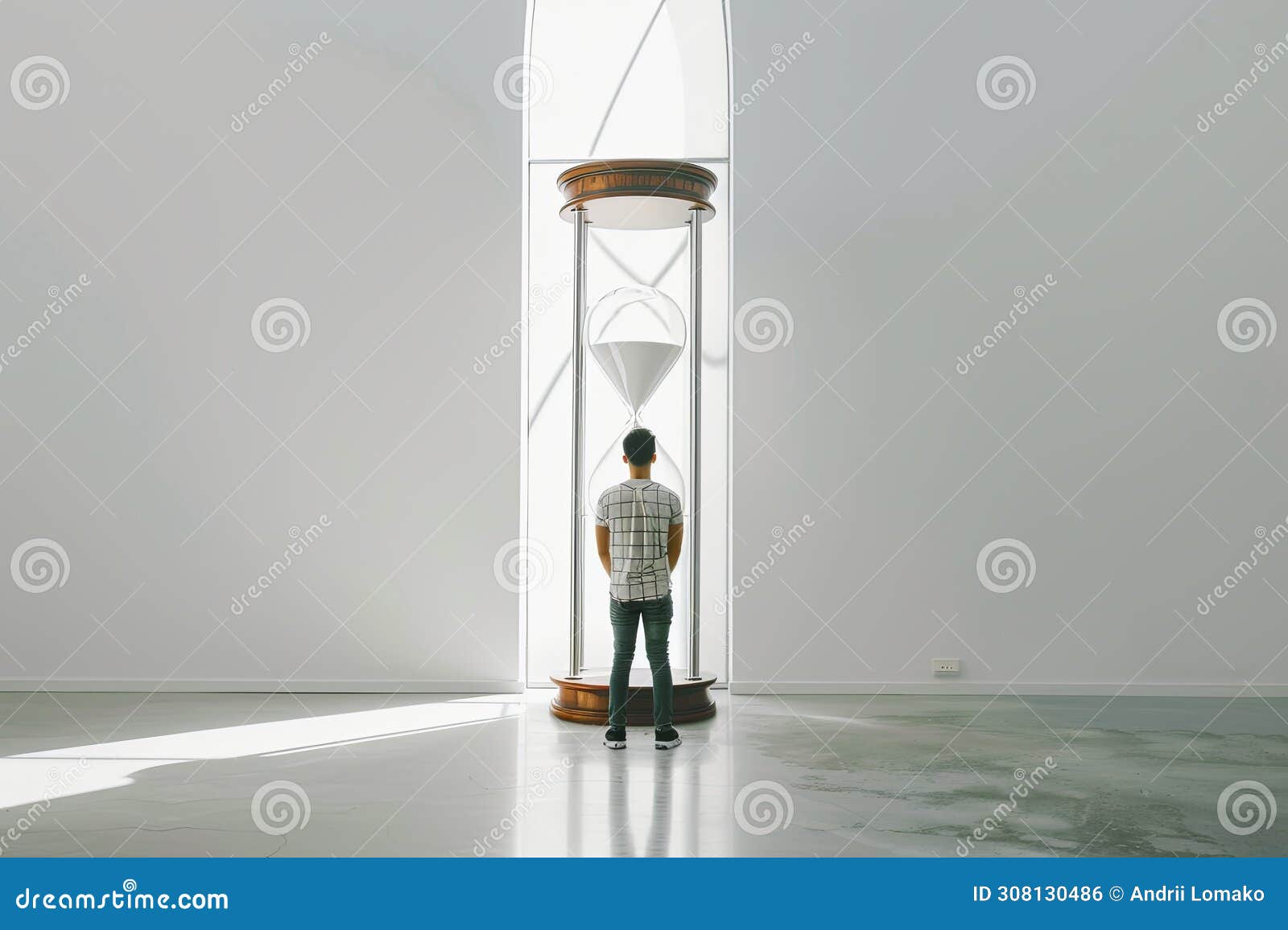Man Standing in Front of Tall Tower Stock Photo - Image of view ...