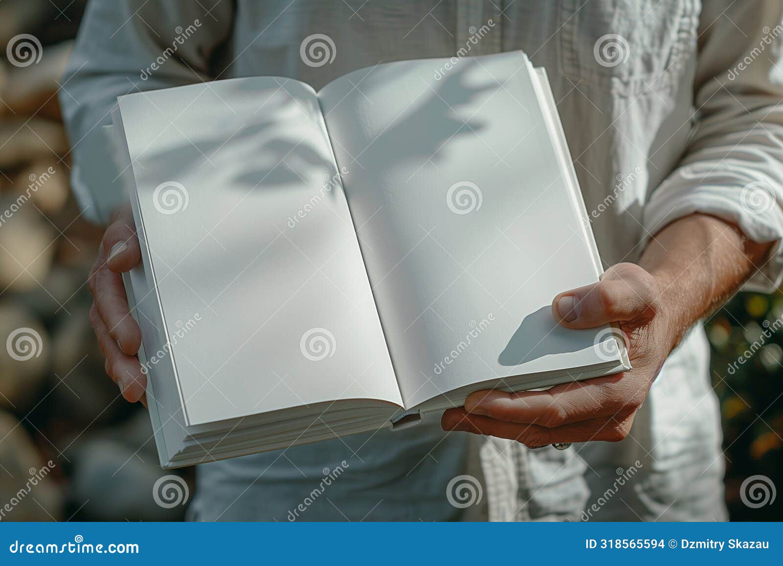 Man Holding Open Book in Front of Tree Stock Photo - Image of mockup ...