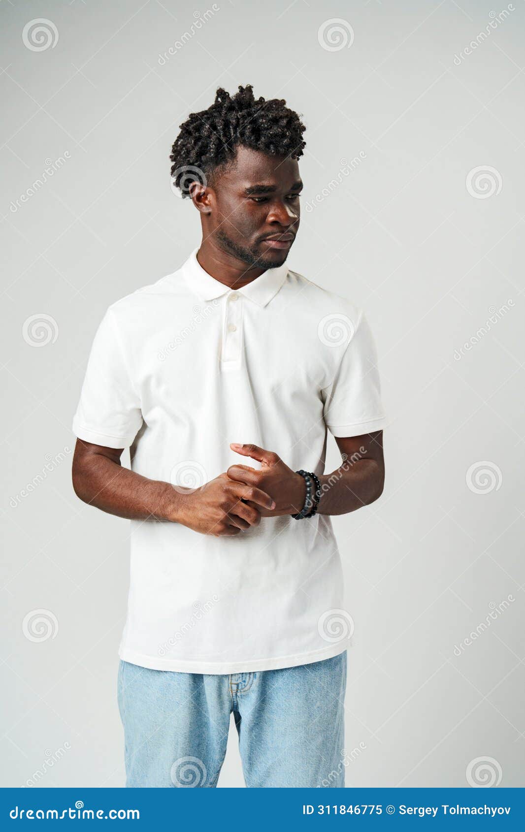 Man Standing in Front of White Wall Stock Image - Image of studio ...