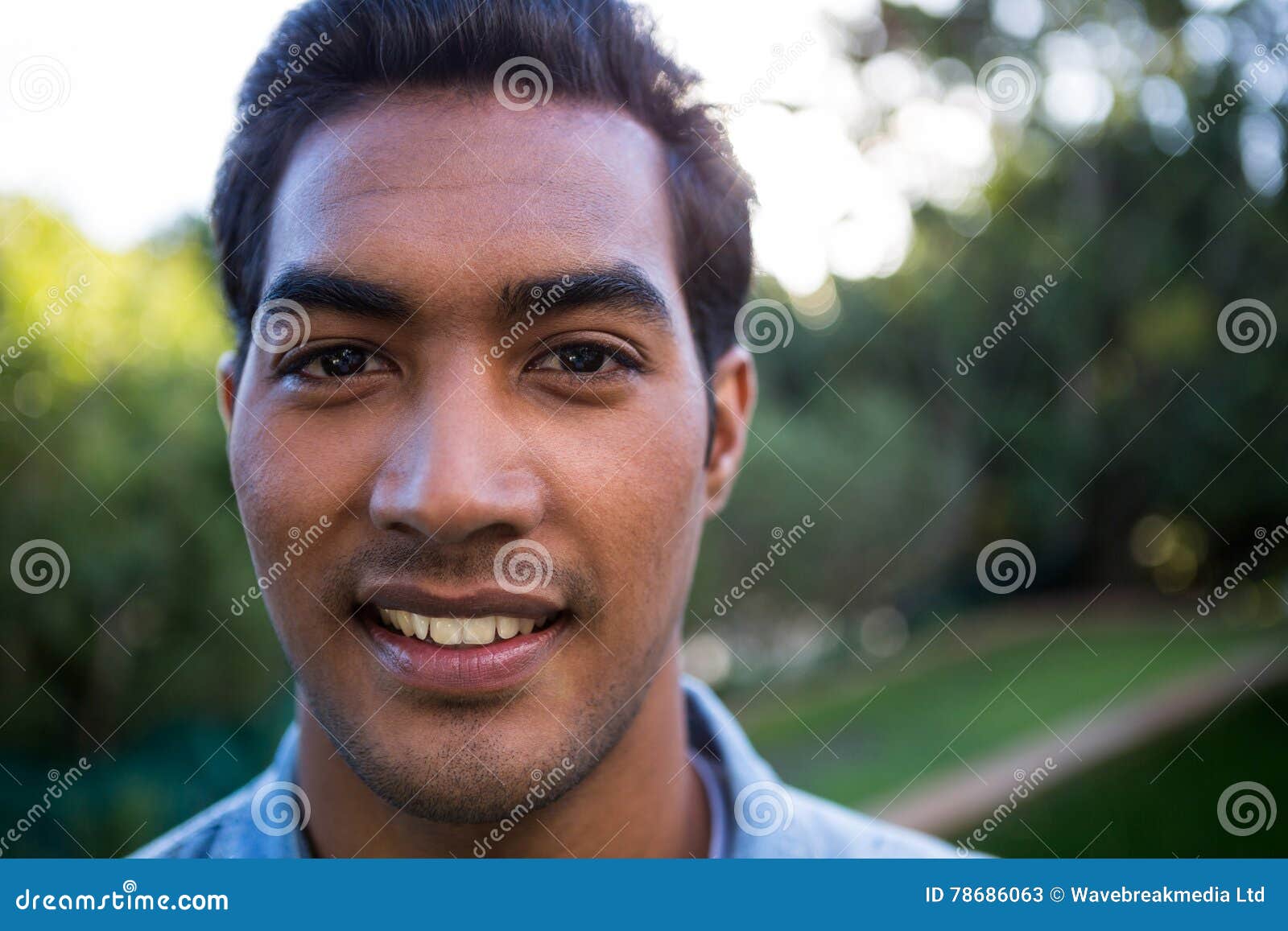 Man standing in the garden stock image. Image of cheerful - 78686063