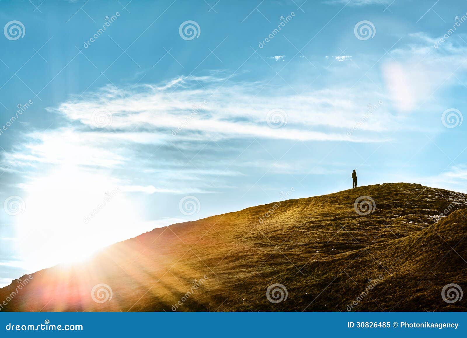 Man Standing on a Hill Thinking in Sunlight Stock Image - Image of ...