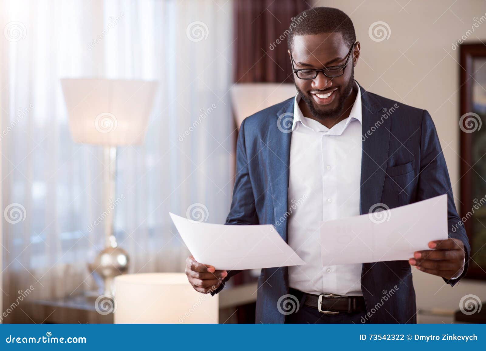 Man Standing and Holding Documents Stock Photo - Image of look, affair ...