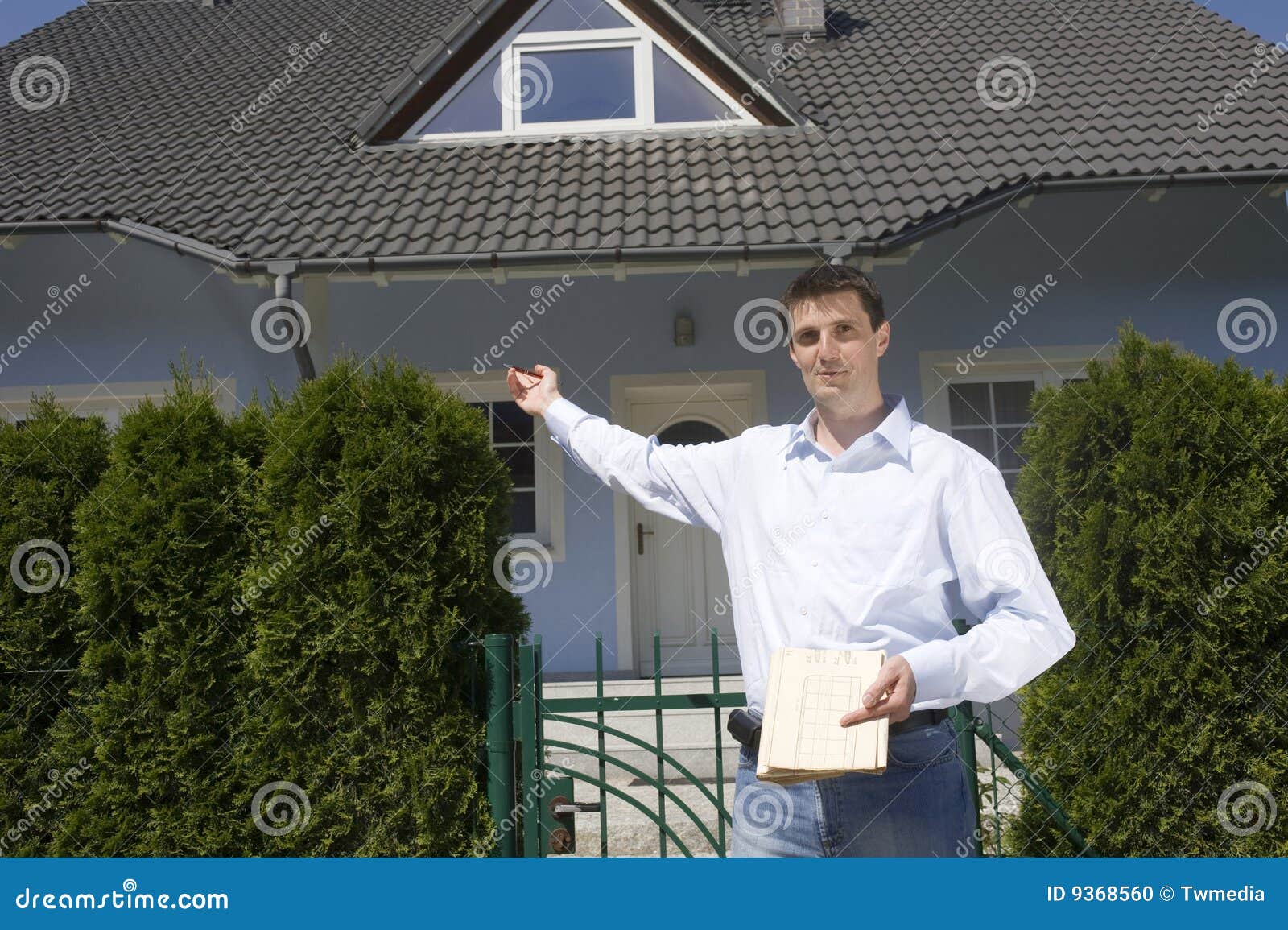 Man Standing before the House Stock Photo - Image of summer, blue: 9368560