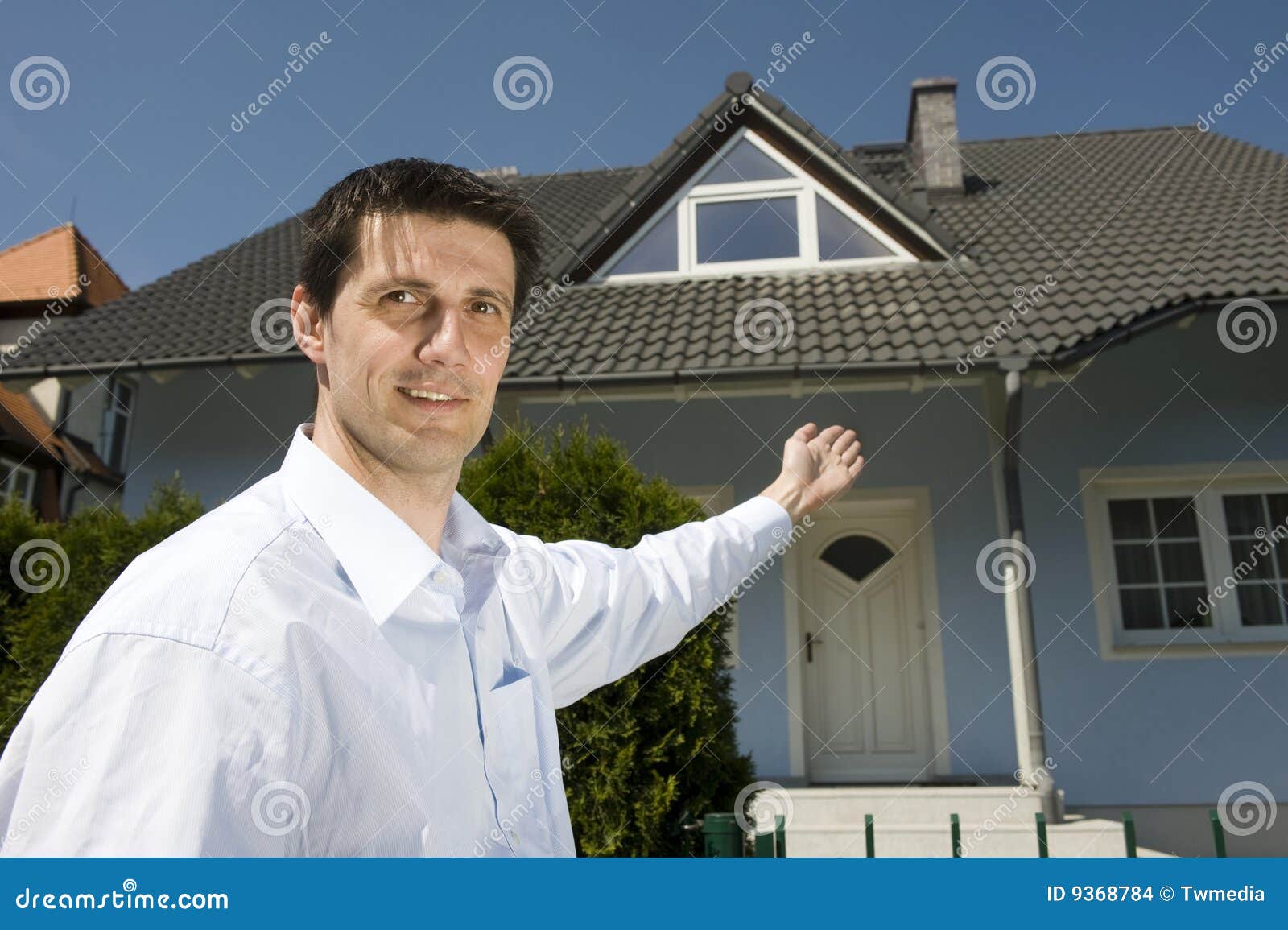 Man Standing before the House Stock Photo - Image of agent, supervision ...