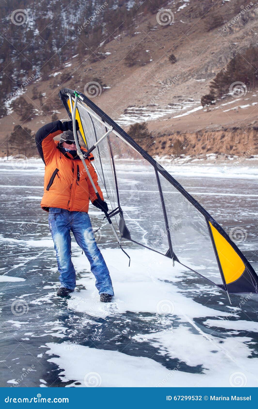 Man Standing on Ice with Wing in the Hands. Stock Photo - Image of ...