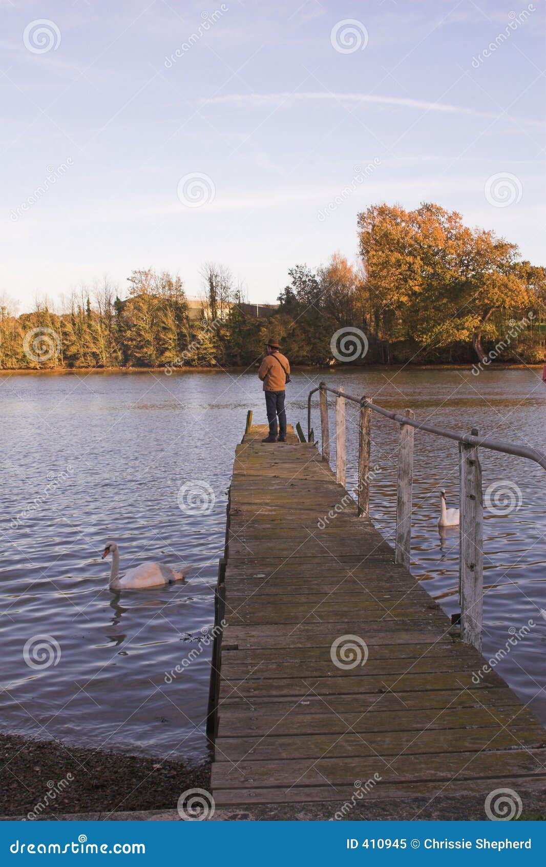 Man Standing on Jetty Over River Stock Image - Image of lonely, sunny ...