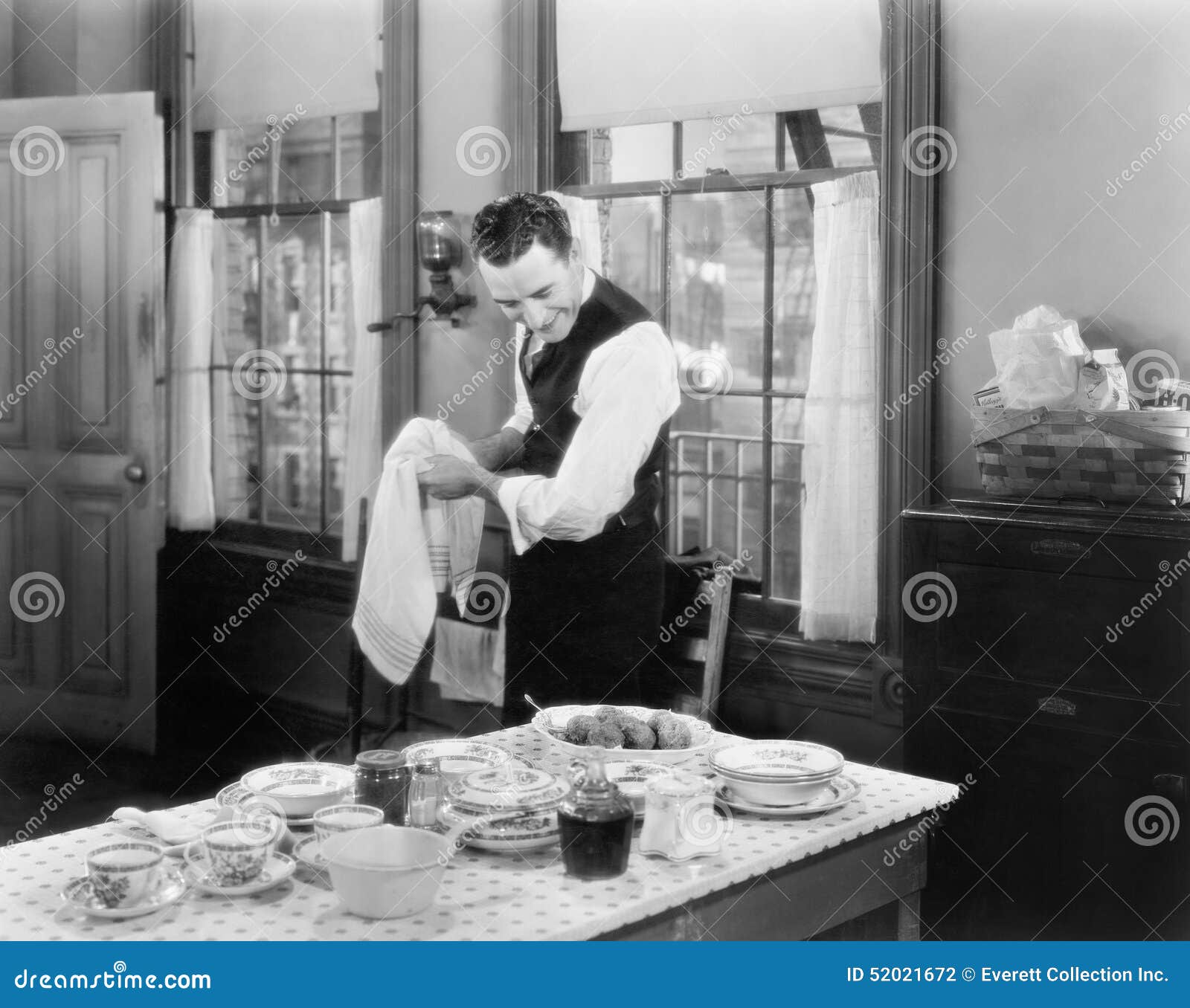 Man Standing in the Kitchen Cooking a Meal Stock Photo - Image of foods ...