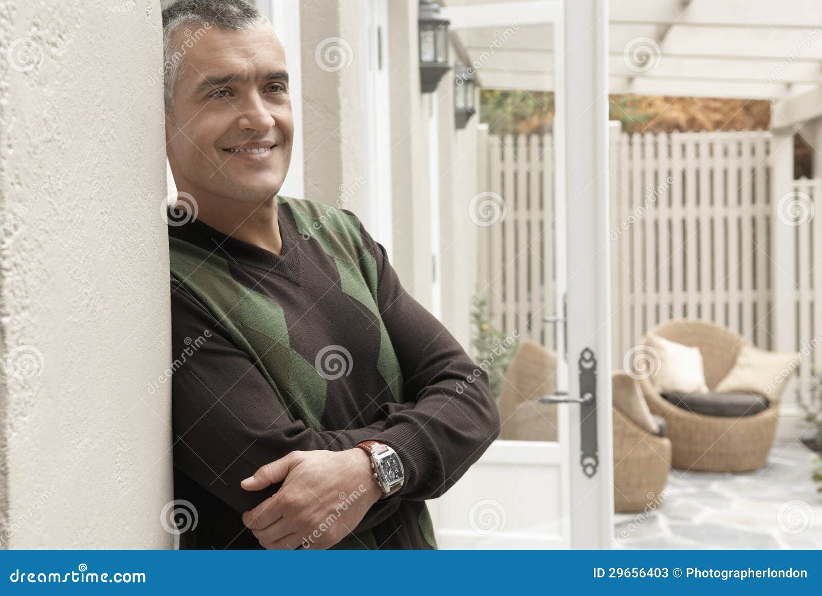 Man Standing Leaning on Pillar Stock Image - Image of happiness, home ...