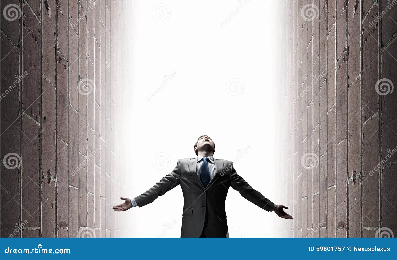 Man standing in light stock image. Image of character - 59801757