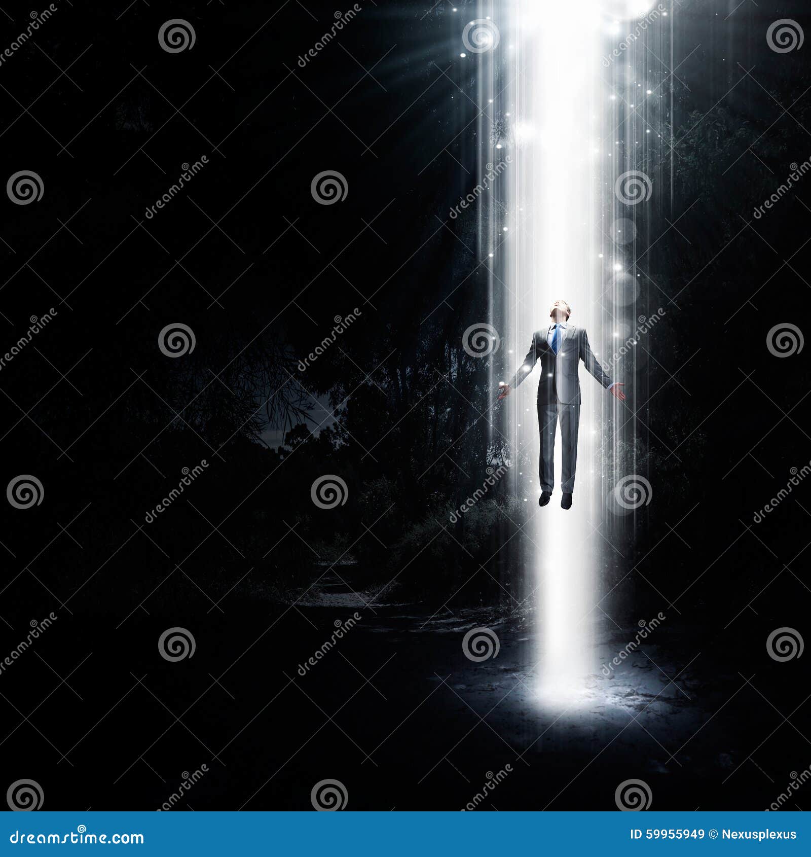 Man standing in light stock image. Image of motivation - 59955949