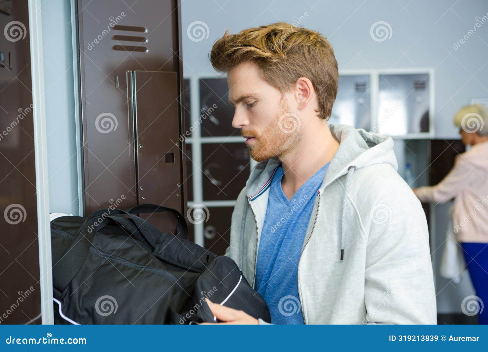 Man Standing in Locker Room Stock Image - Image of strength, people ...