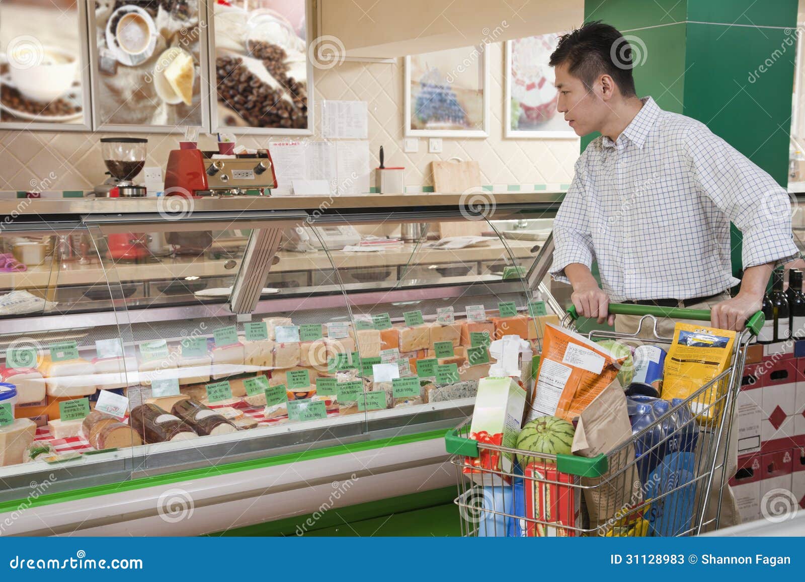 Man Standing and Looking at the Deli Counter, Trying To Decide Stock ...