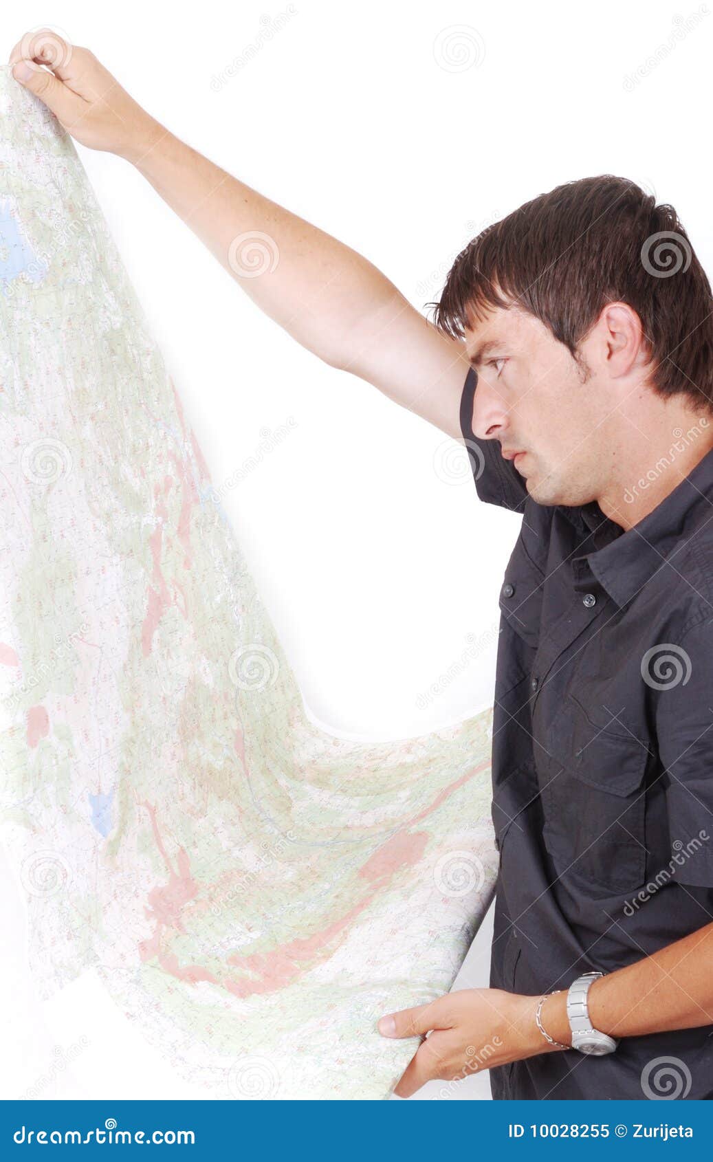 Man Standing and Looking at Maps in His Hands Stock Image - Image of ...