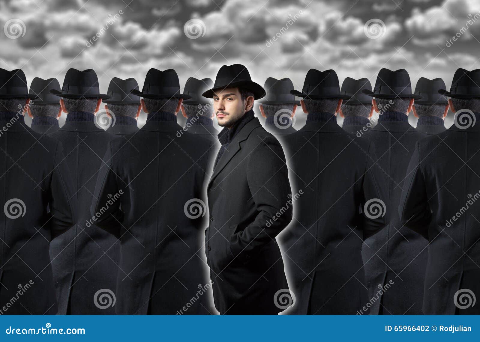 Man Standing Out from the Crowd Stock Photo - Image of original ...