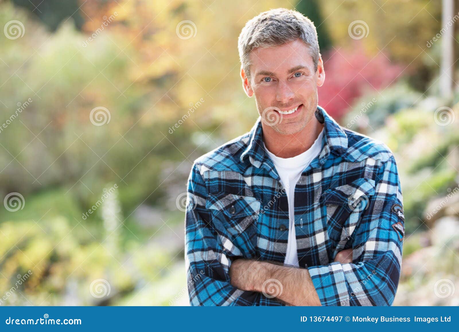 Man Standing Outside in Autumn Landscape Stock Image - Image of ...