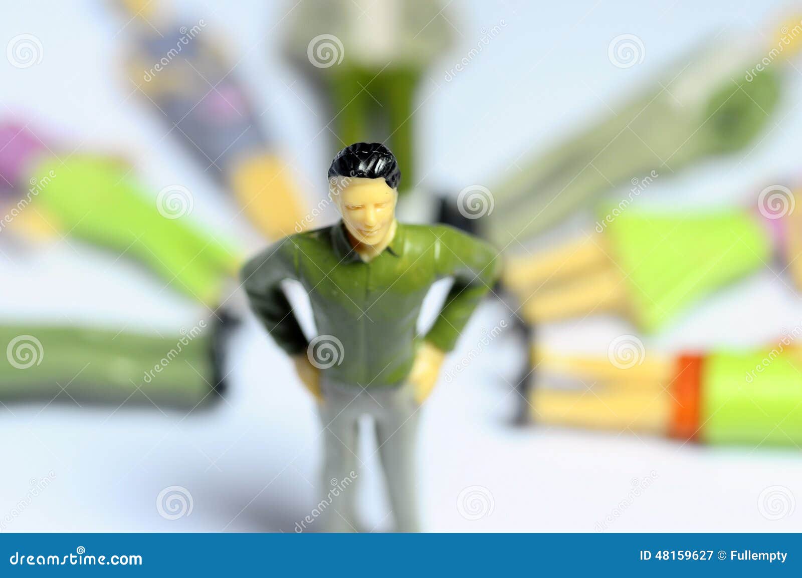 Man Standing Over Lying Figures Stock Image - Image of figurine, figure ...
