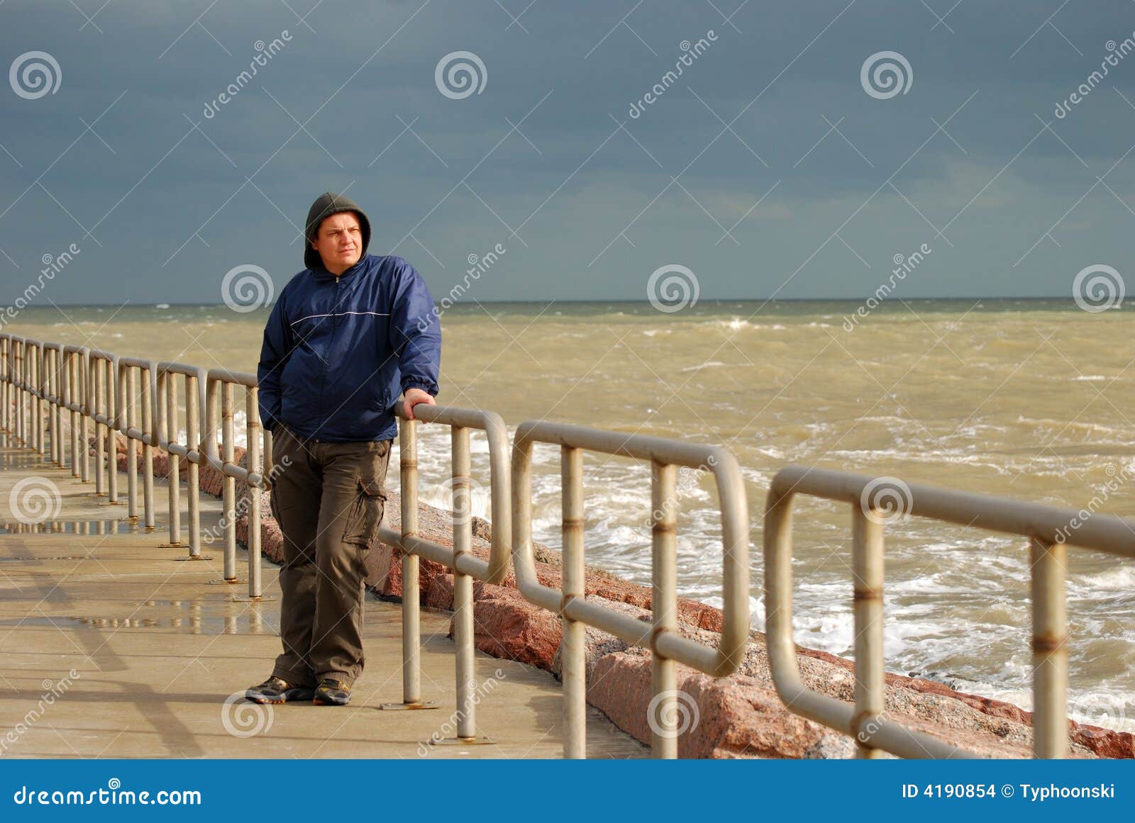 Man standing on the pier stock photo. Image of coast, young - 4190854