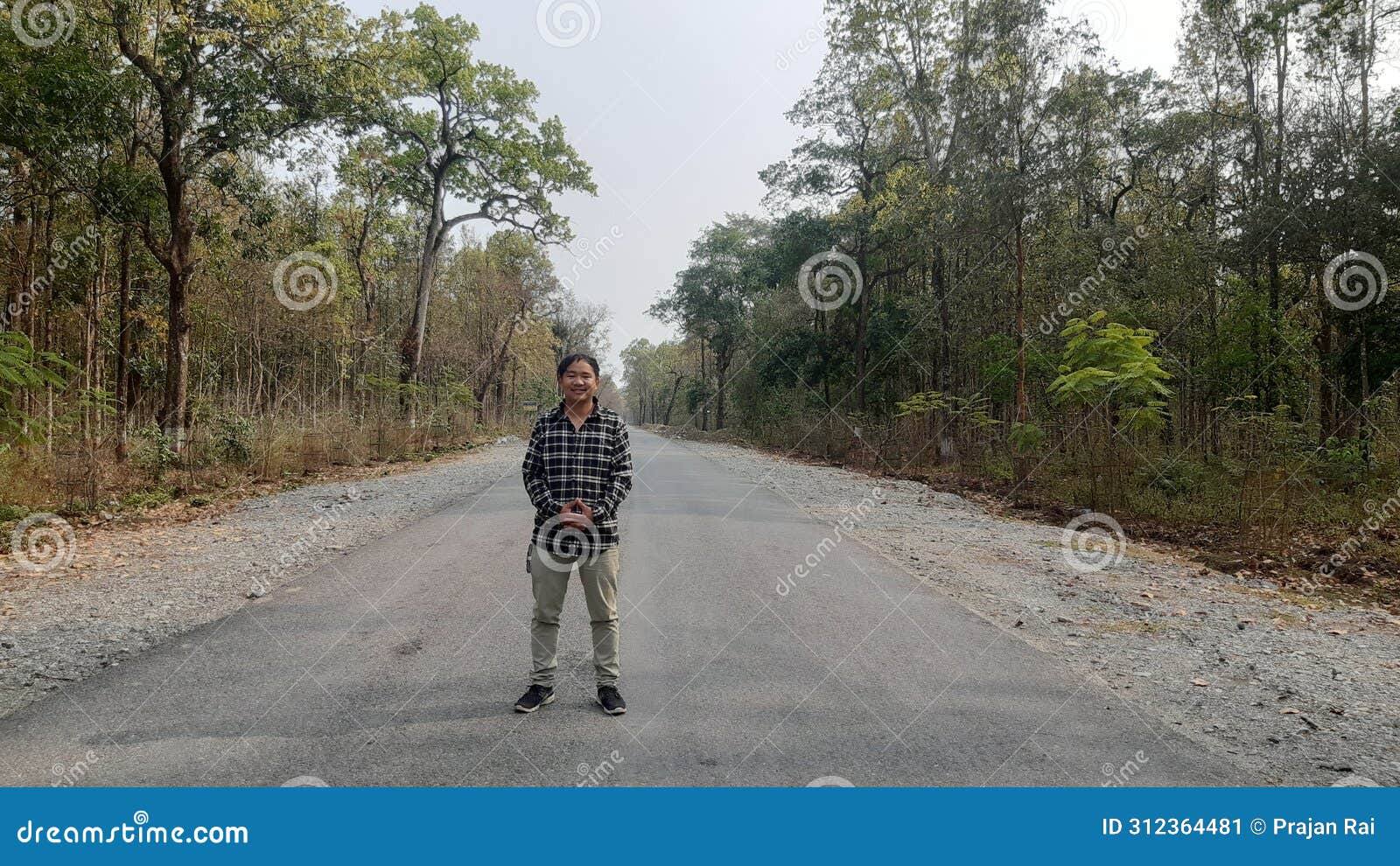 A Man Standing on the Pitch Road Surrounded by the Jungle | Nepali Face ...