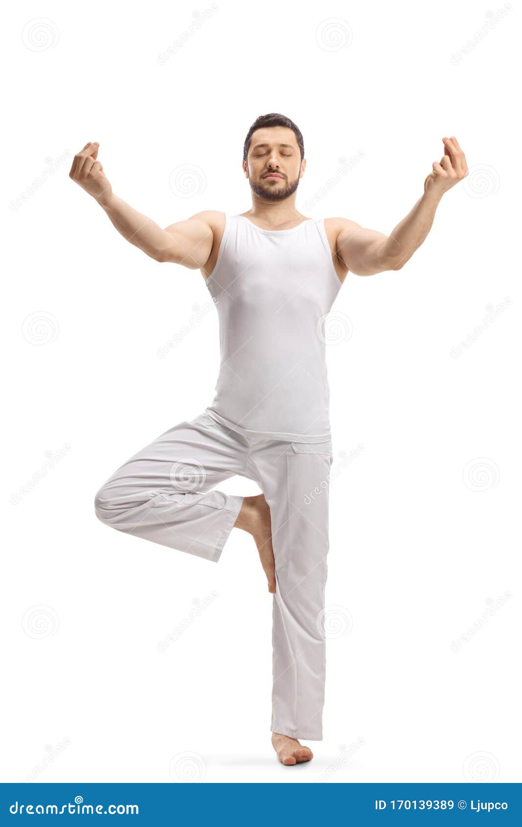 Man in a Standing Position Practicing a Yoga Pose Stock Image - Image ...