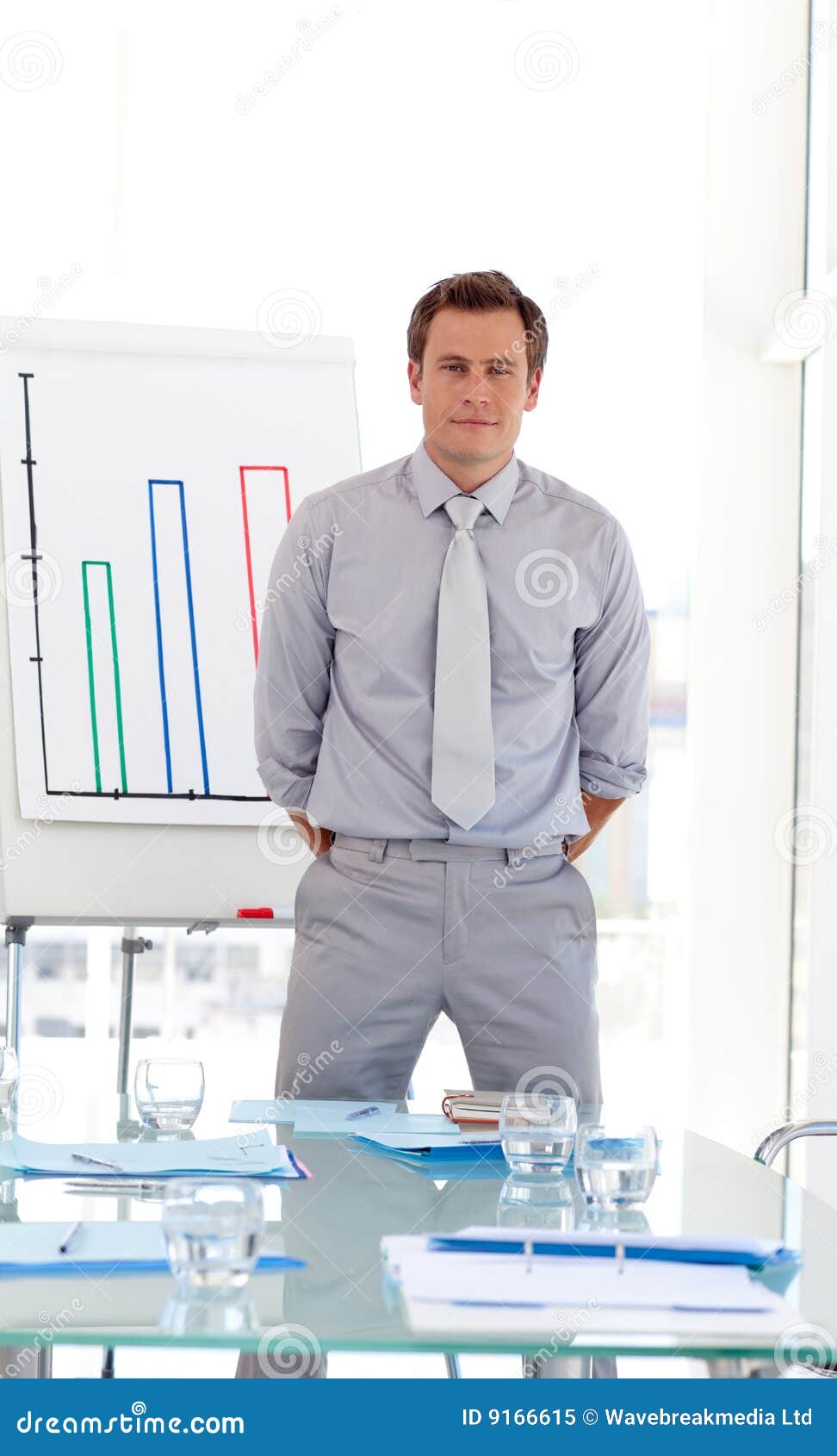 Man Standing in a Presentation Stock Image - Image of holding, board ...