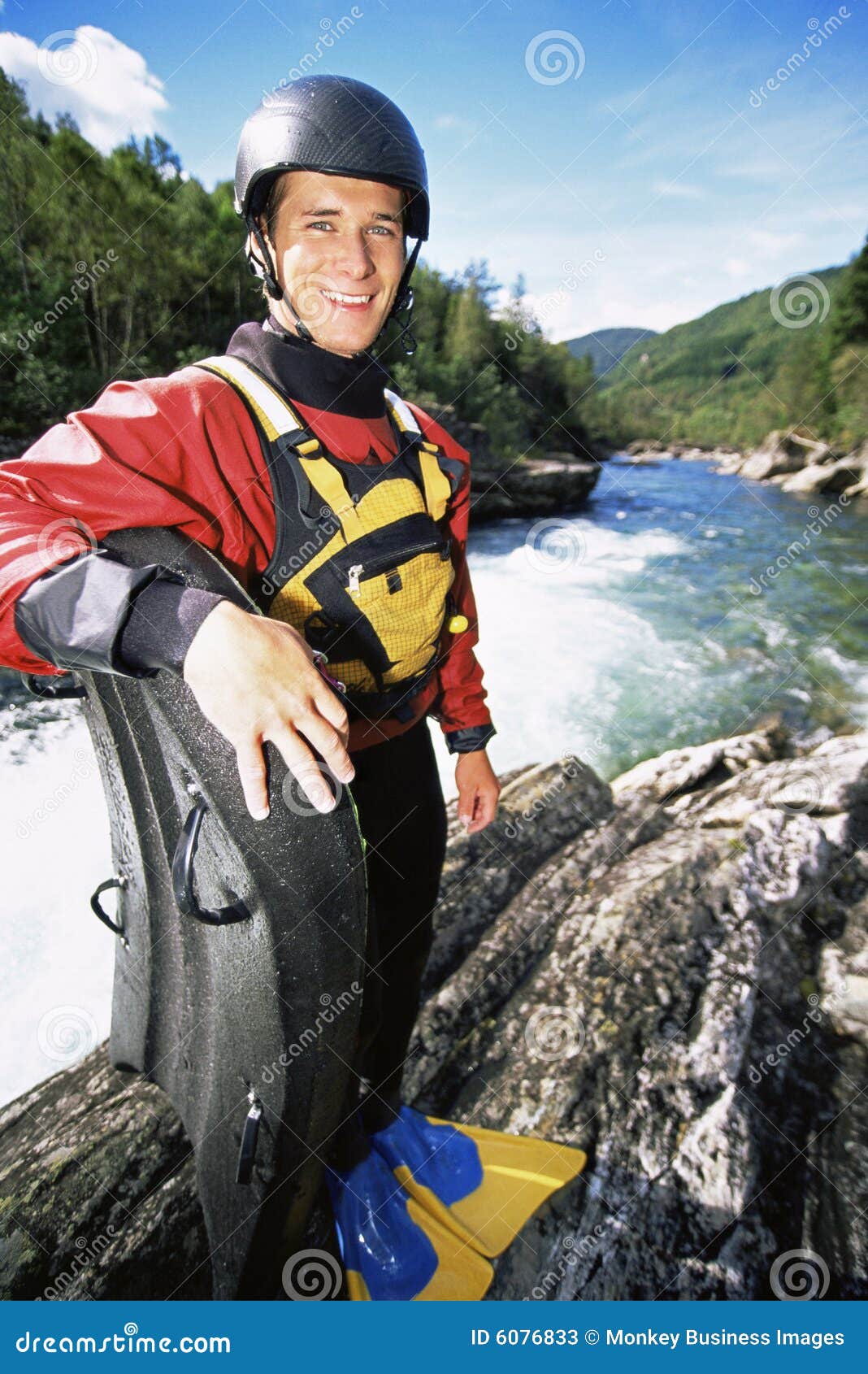 Man Standing with Raft beside River Stock Image - Image of trees, river ...