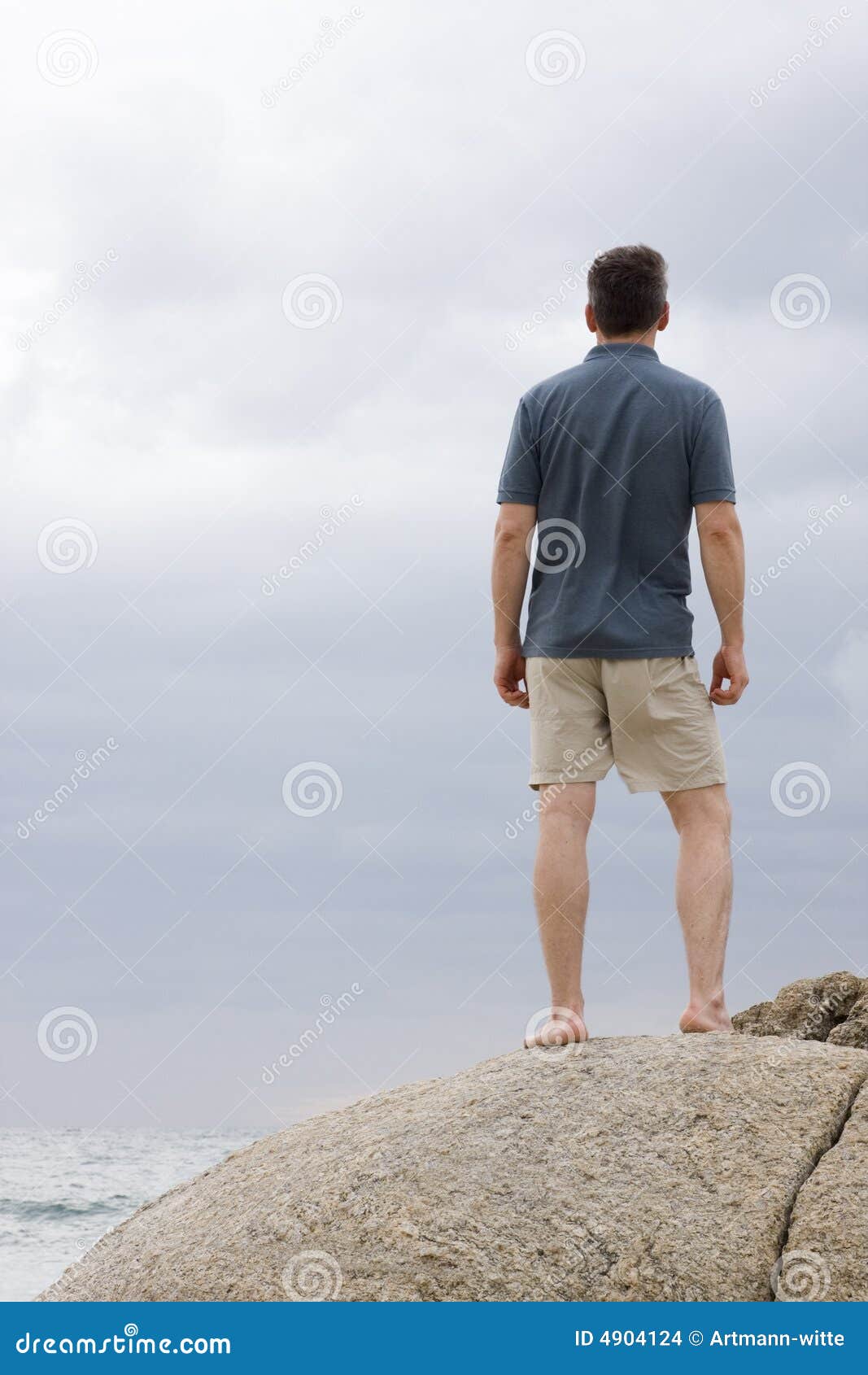 Man Standing on a Rock at the Sea Stock Photo - Image of vacations ...
