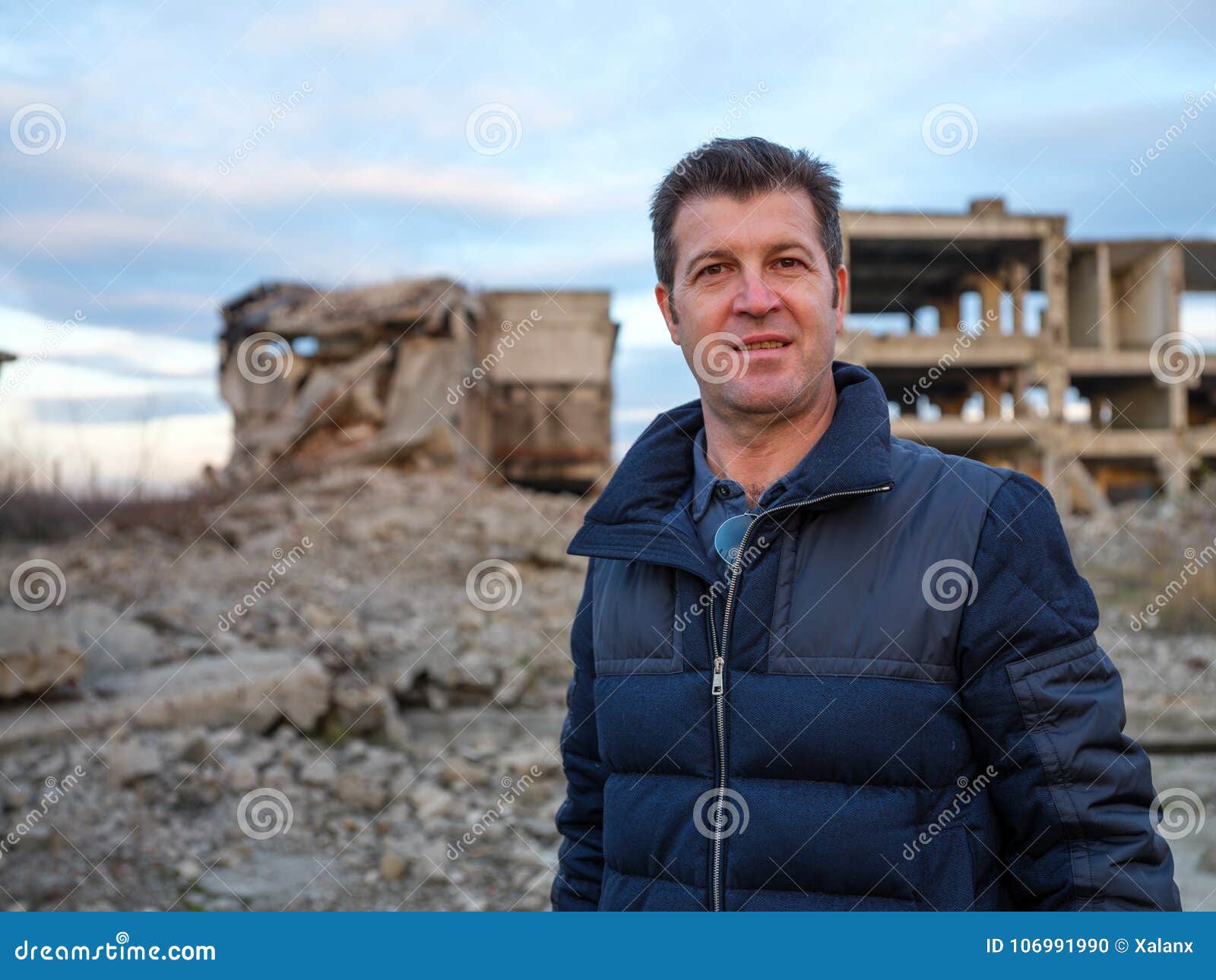 Man standing among ruins stock photo. Image of concrete - 106991990
