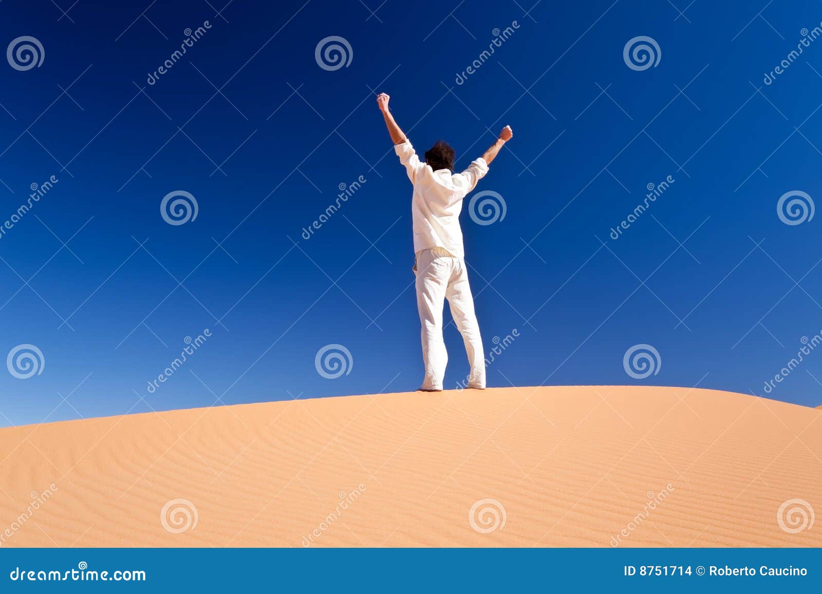 Man Standing on a Sand Dune Stock Photo - Image of summer, yellow: 8751714