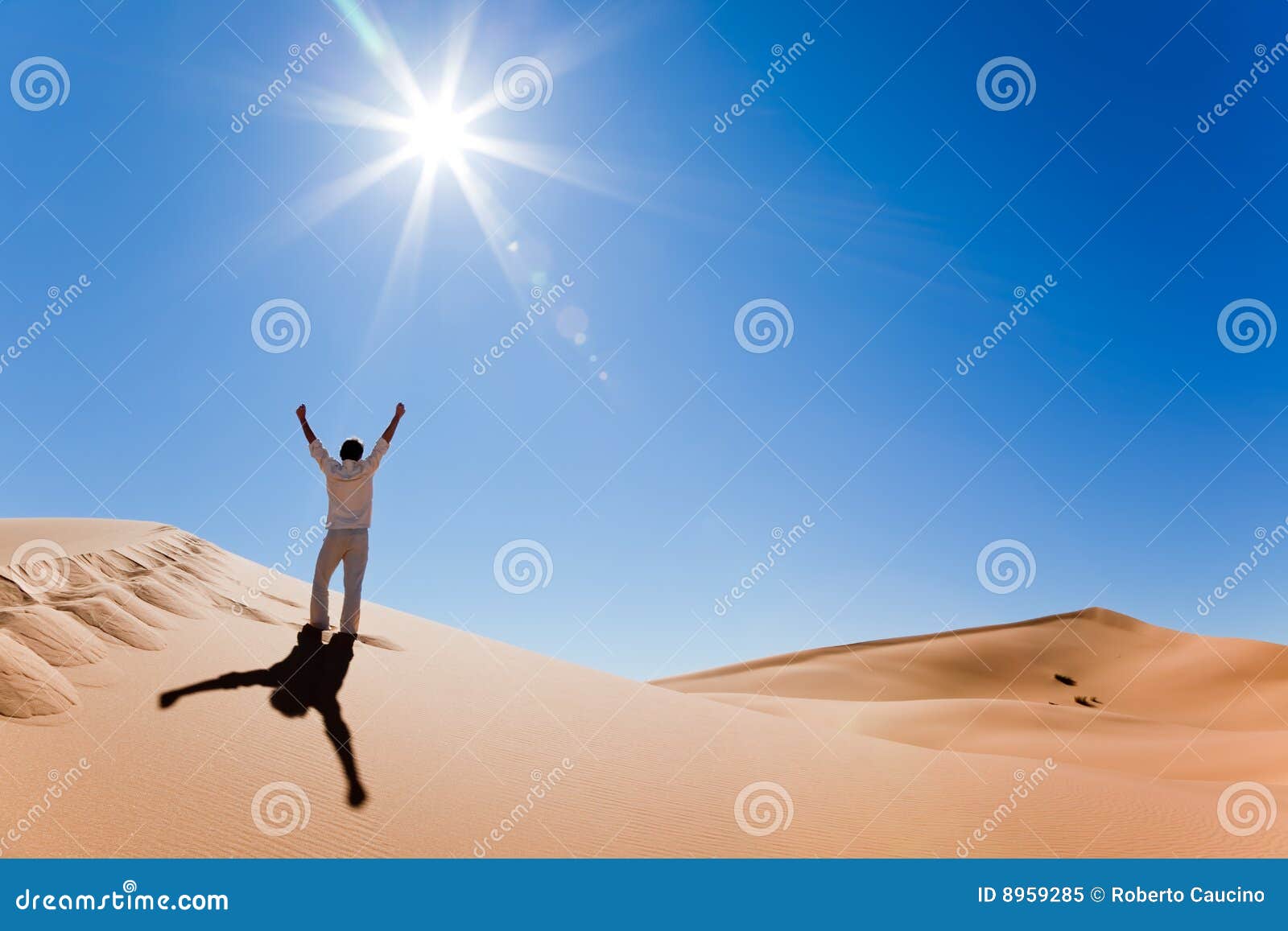 Man Standing on a Sand Dune Stock Image - Image of back, north: 8959285