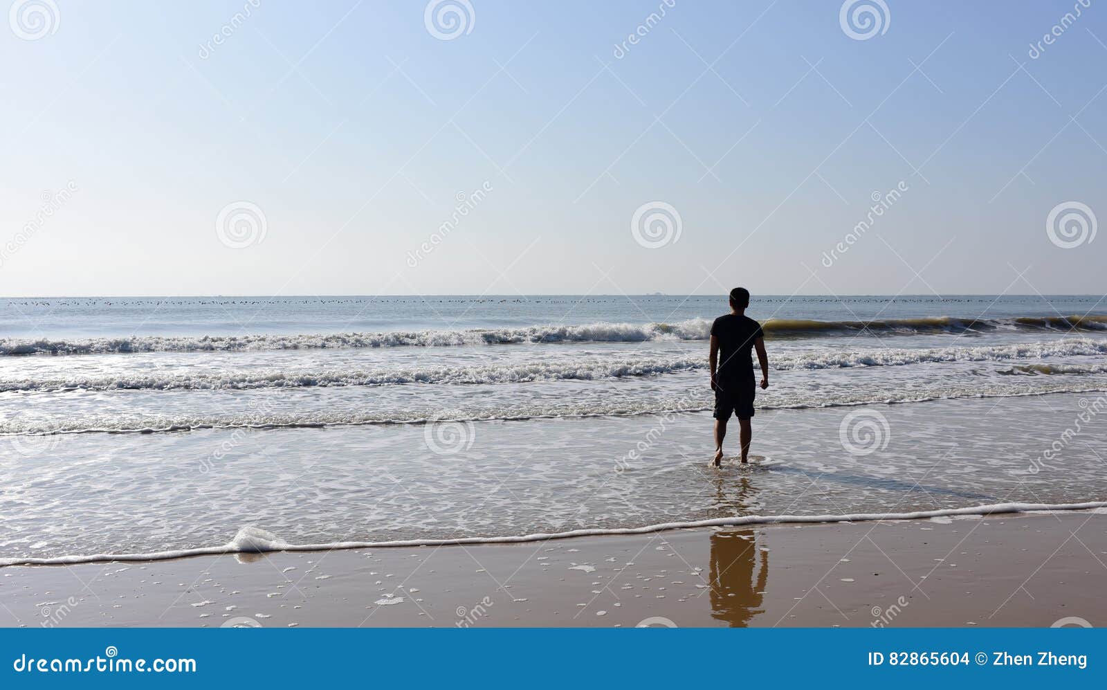 Man Standing in Sea with Waves Stock Photo - Image of nature, standing ...